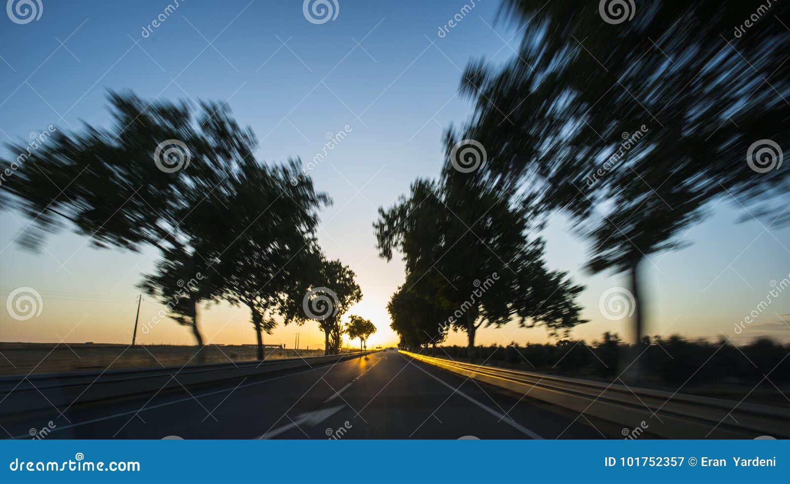 Car Driving on Freeway at Sunset with Motion Blur Stock Image - Image ...