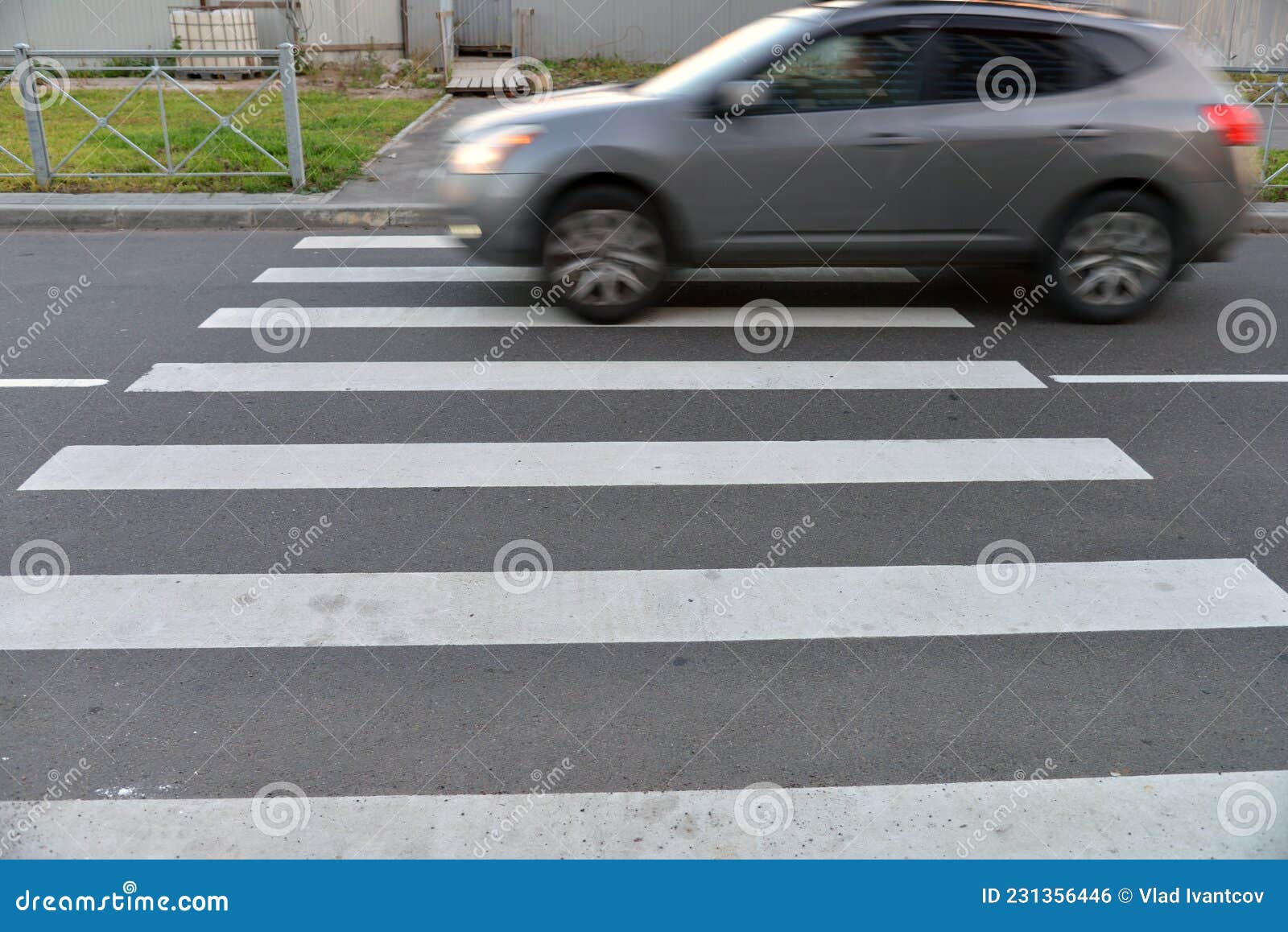 Car is Driving Past a Pedestrian Crossing Stock Photo - Image of ...