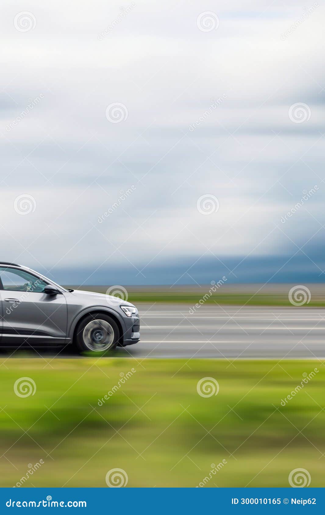Car Driving on the Road. Gray Car in Motion, Speed Blurred Background ...