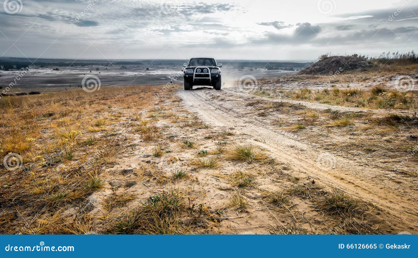 Car Driving on a Rolled Road in a Field Stock Image - Image of field ...