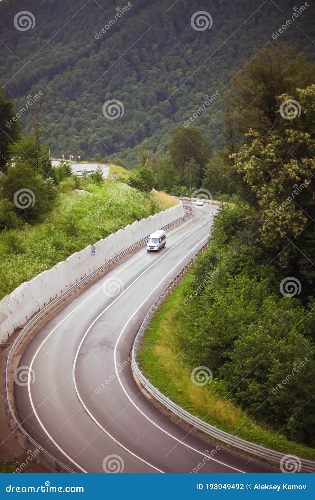 The Car is Driving on a Steep Road in a Mountainous Area Stock Photo ...