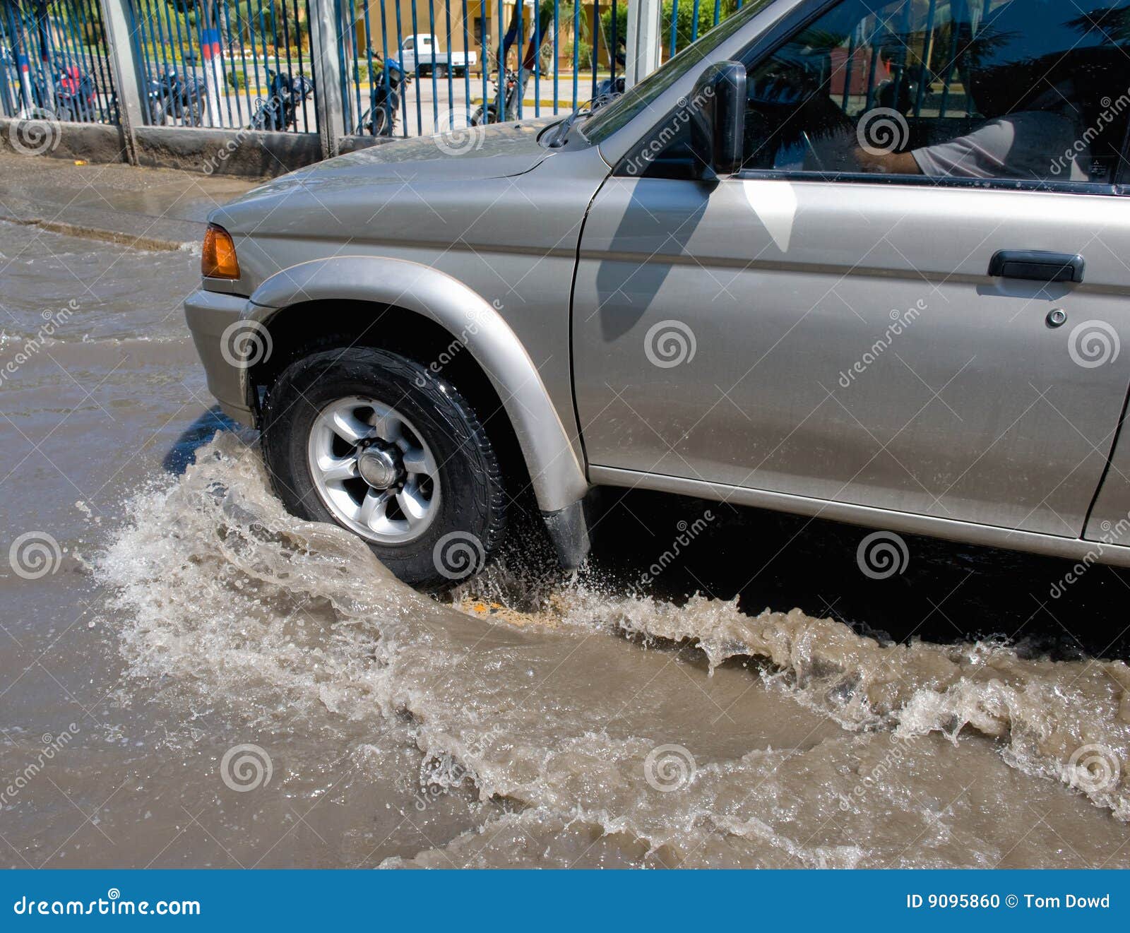 Car driving through water stock photo. Image of flooding - 9095860