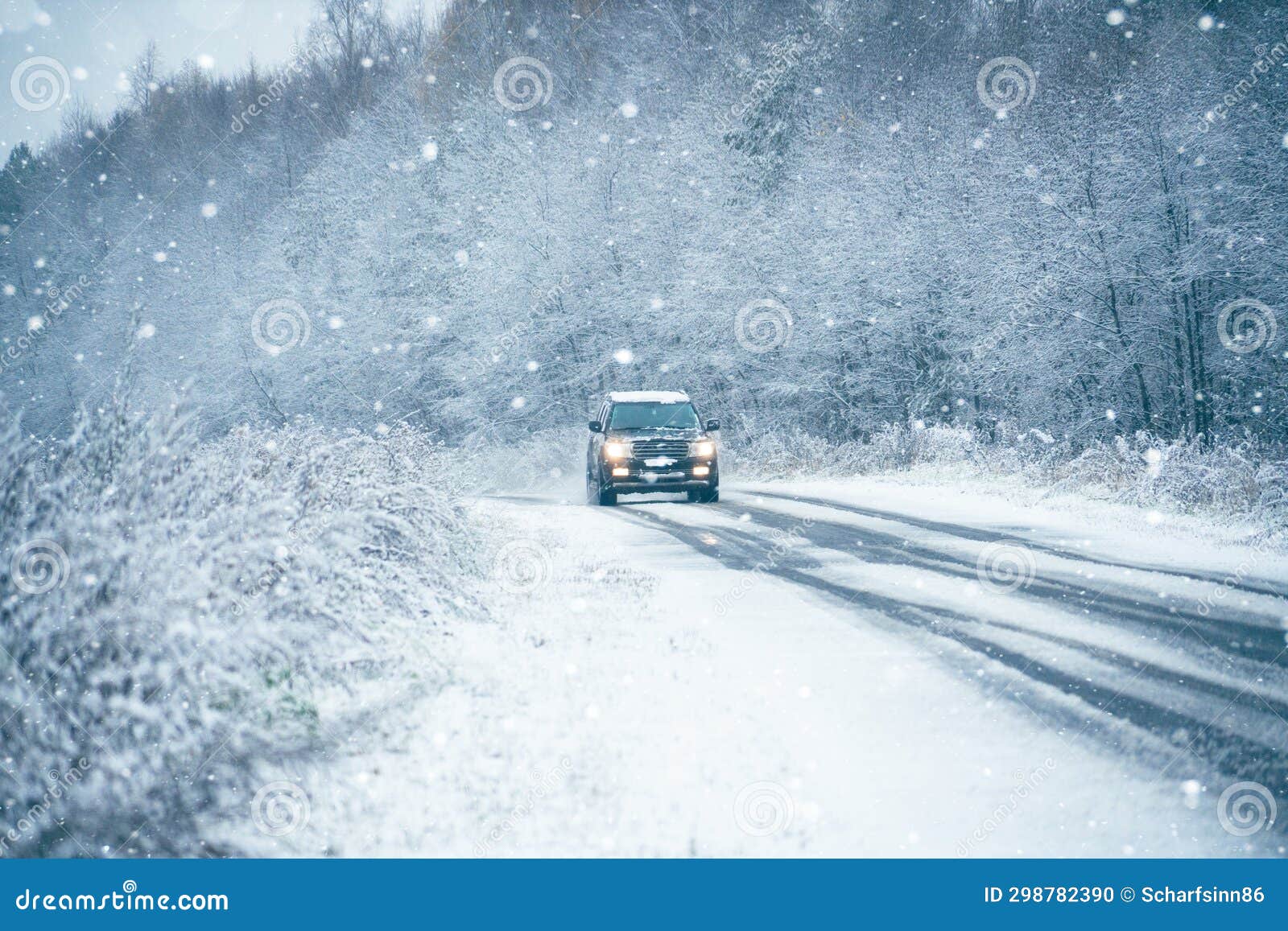 The Car is Driving on a Winter Road in a Blizzard Stock Photo - Image ...