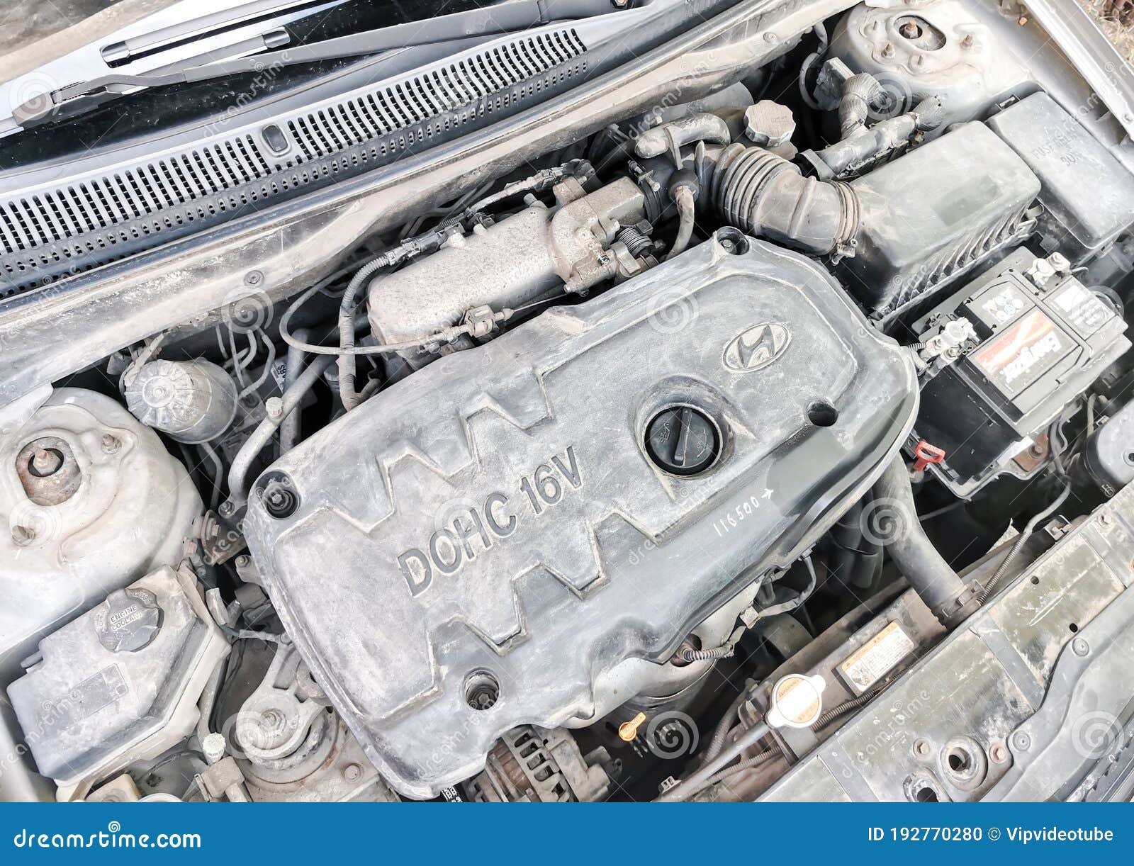 Car Engine Covered with Dust Located Under the Hood of a Car. Editorial ...