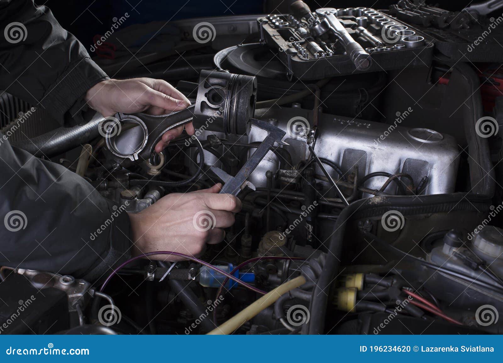 Car engine maintenance. stock photo. Image of engineering - 196234620