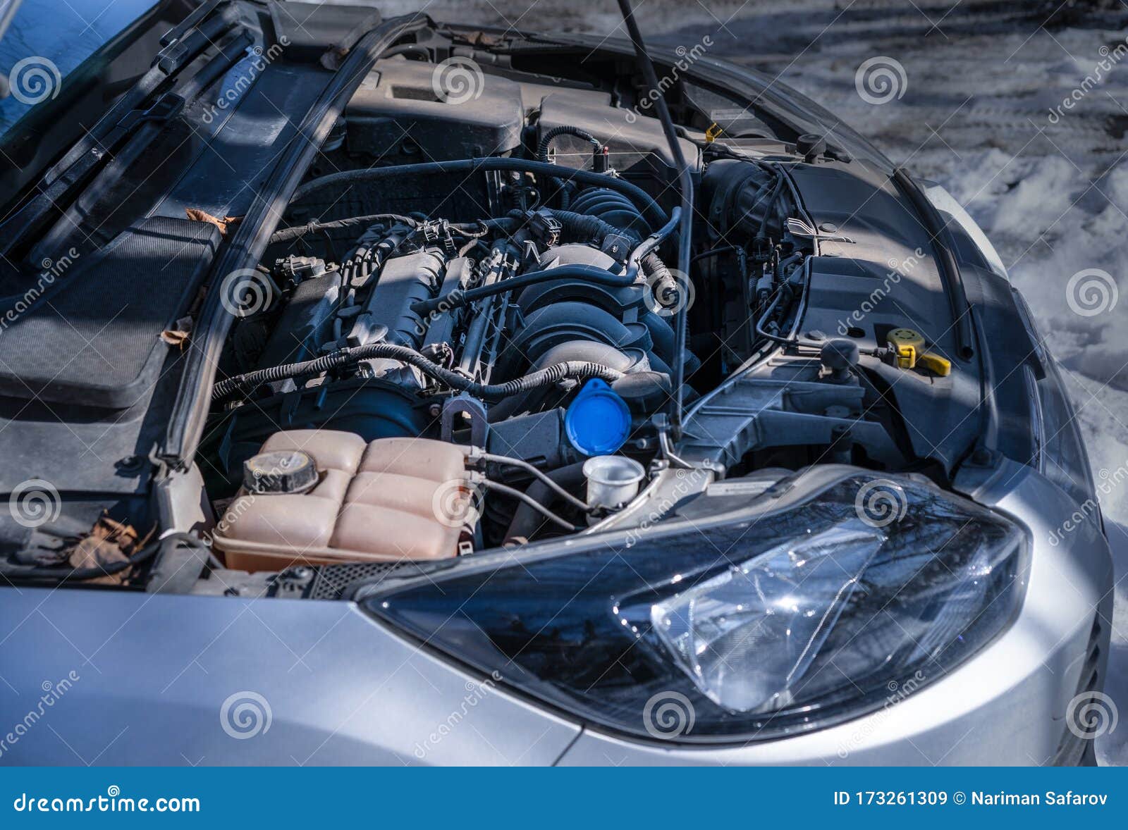 Car engine in an open hood stock image. Image of engine - 173261309