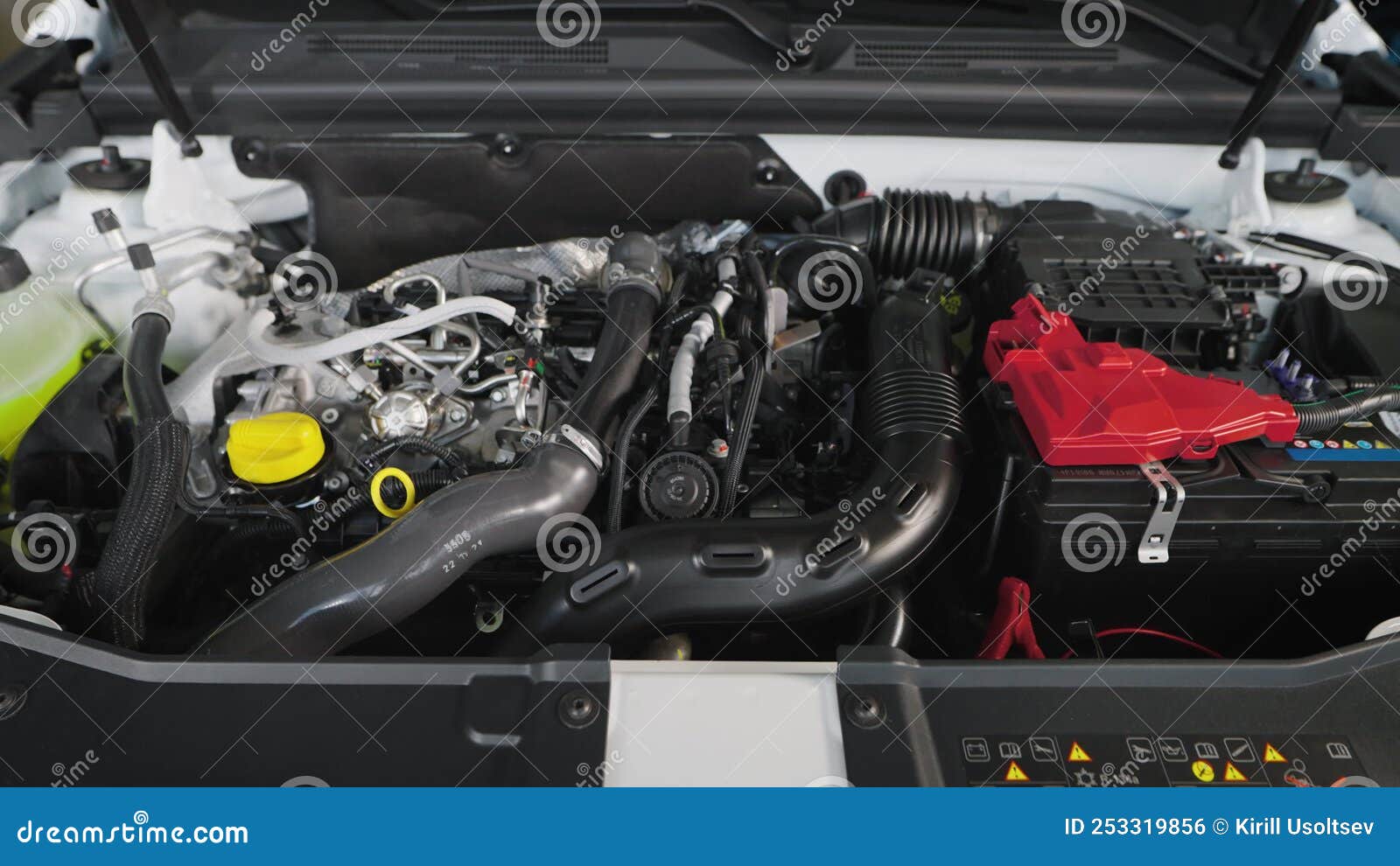 Car Engine Under the Hood of a Modern Car. New Car in the Showroom ...