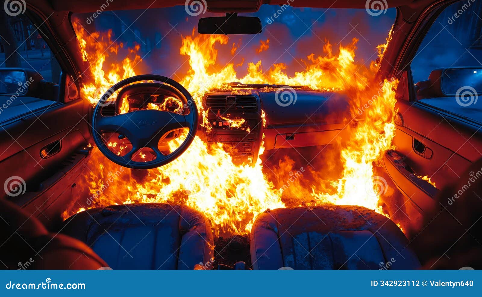 A Car is Engulfed by Flames on the Dashboard of a Car Stock Photo ...
