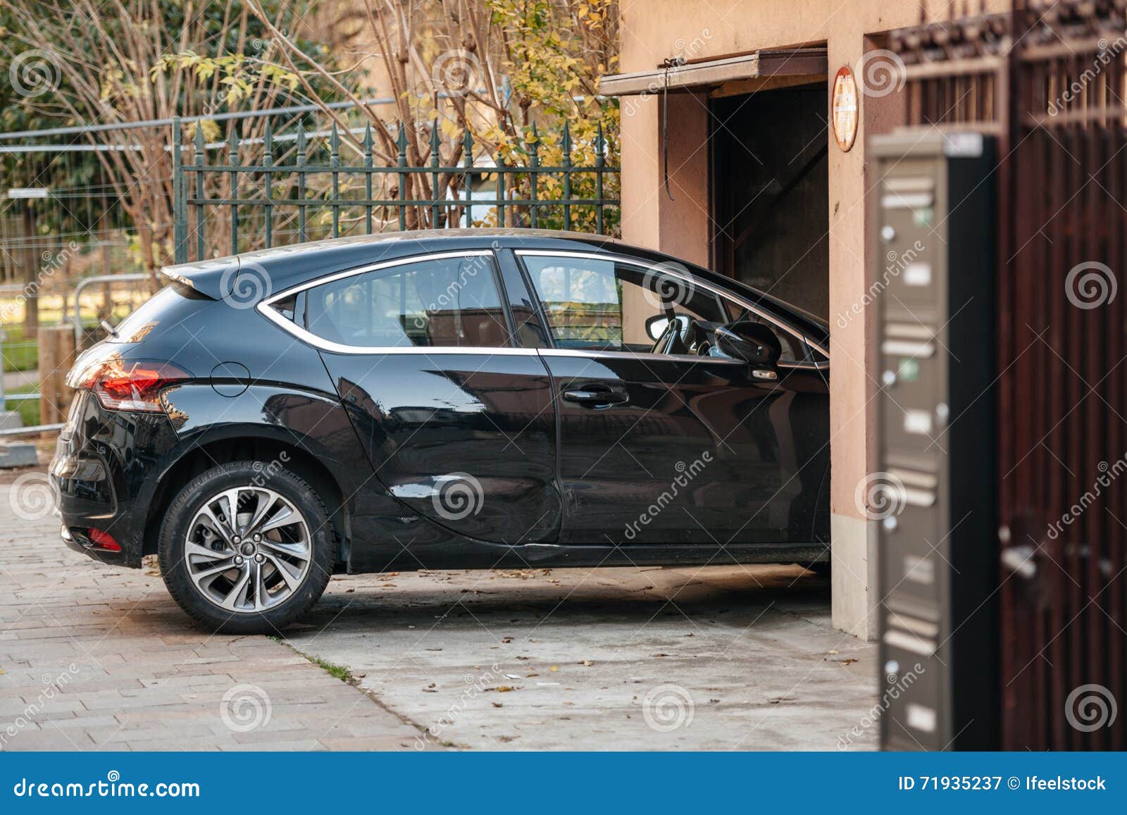 Detail Car Entering Garage Door Stock Photos - Free & Royalty-Free ...