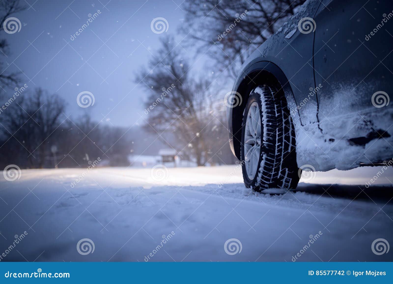 Car and Falling Snow in Winter on Forest Road Stock Photo - Image of ...