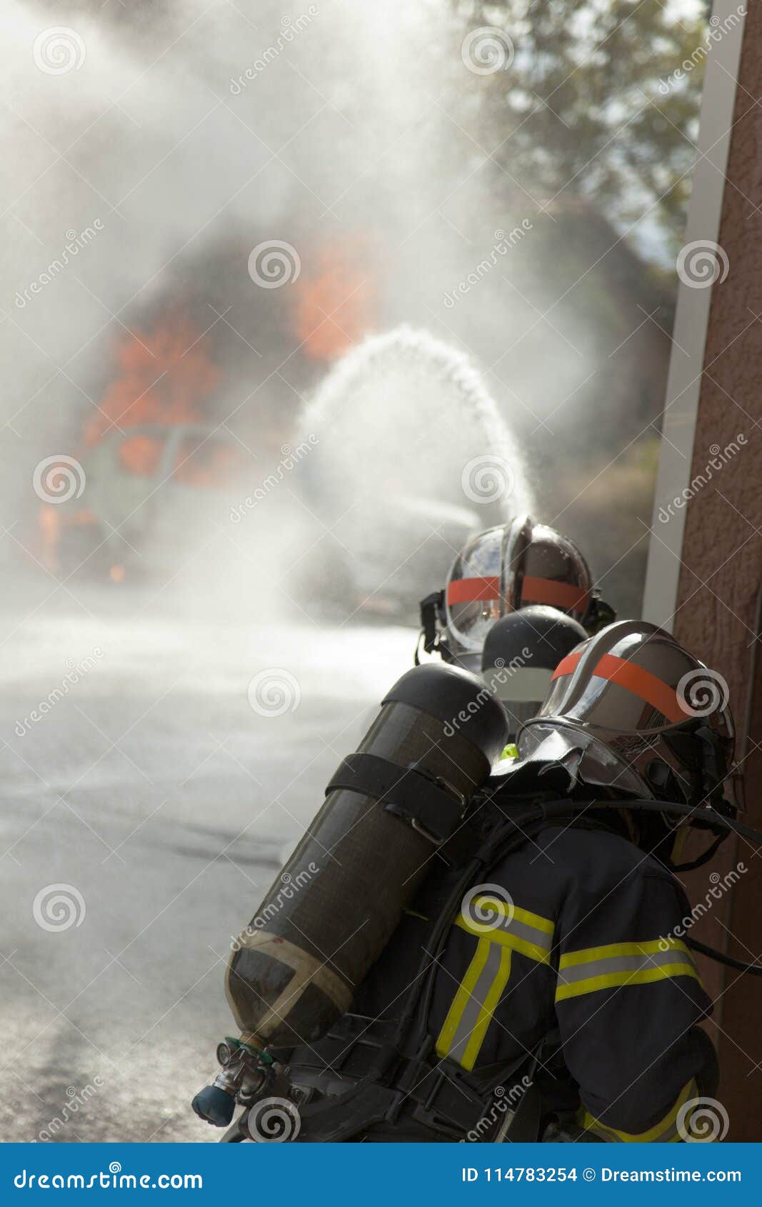Car on Fire Burn Flame and Two Firefighter Brigade with Helmet Stock ...