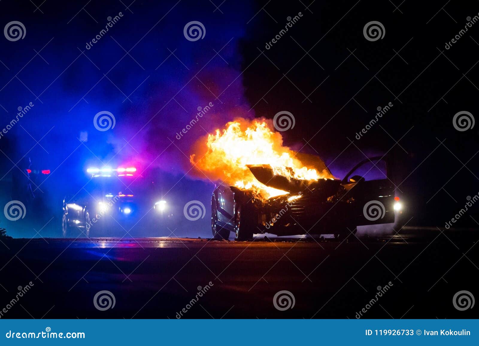 Car on Fire at Night with Police Lights in Background Stock Image ...