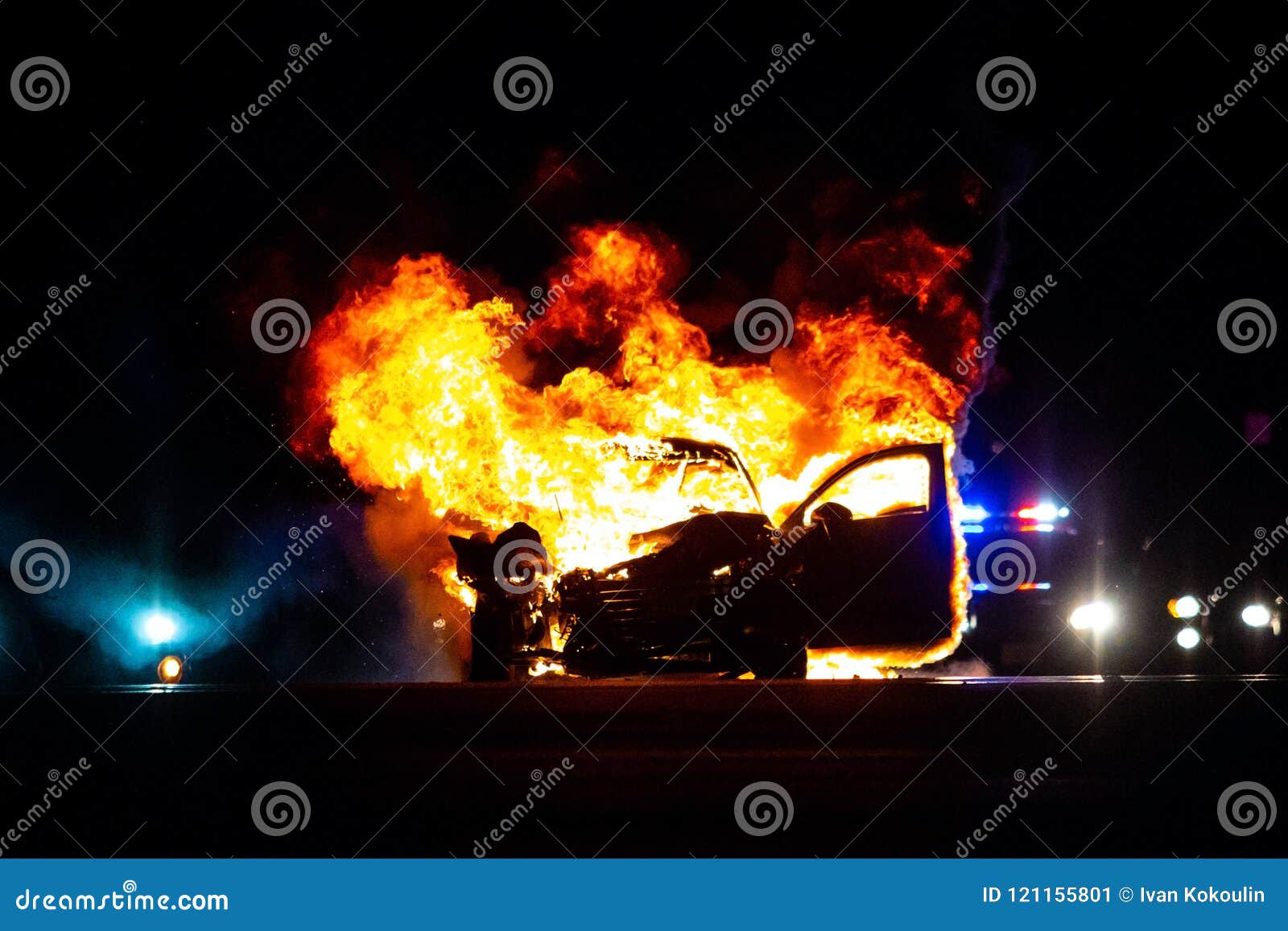 Car on Fire at Night with Police Lights in Background Editorial Photo ...