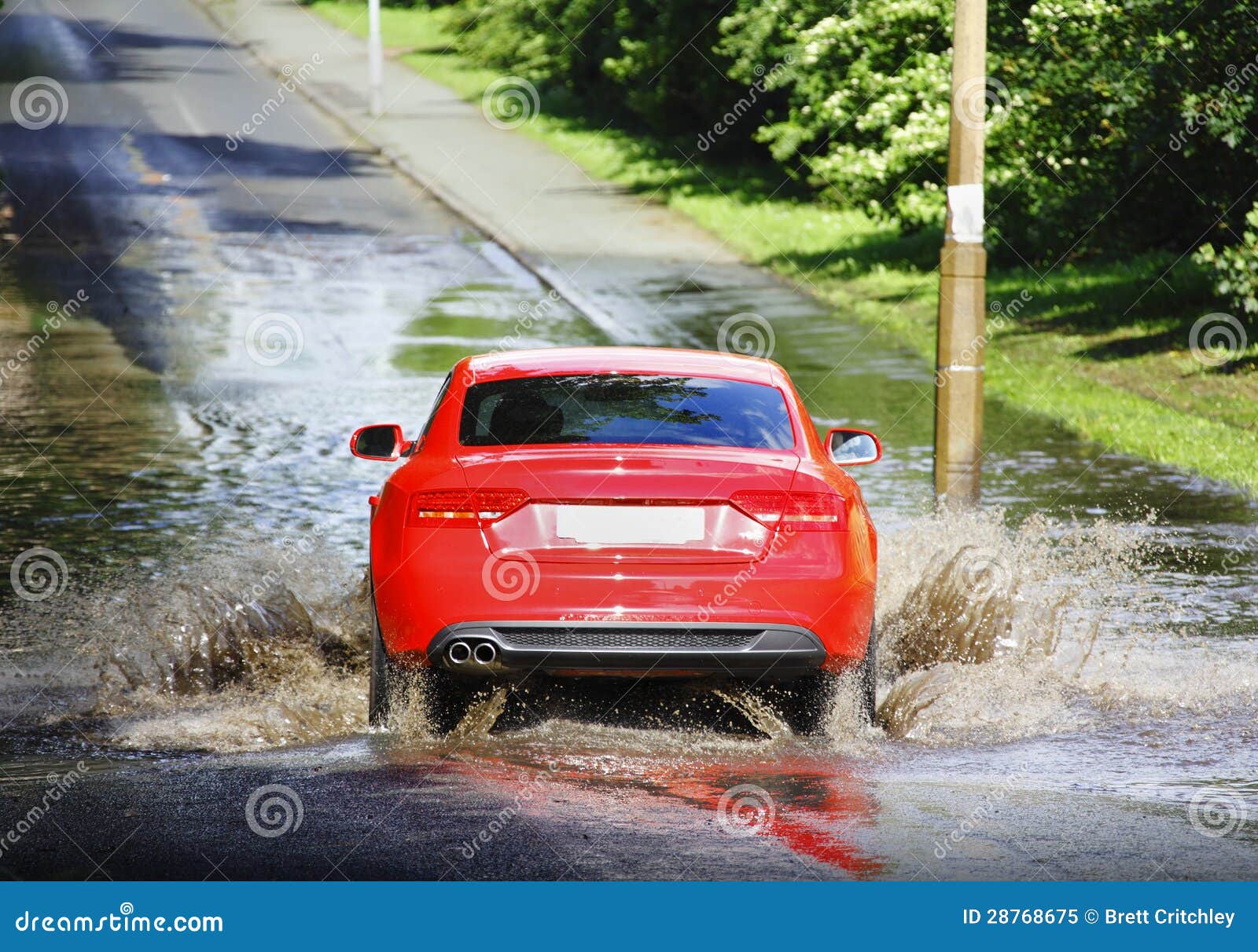 Flood Water Overflows From A Lake During Flooding After Heavy Rain And ...