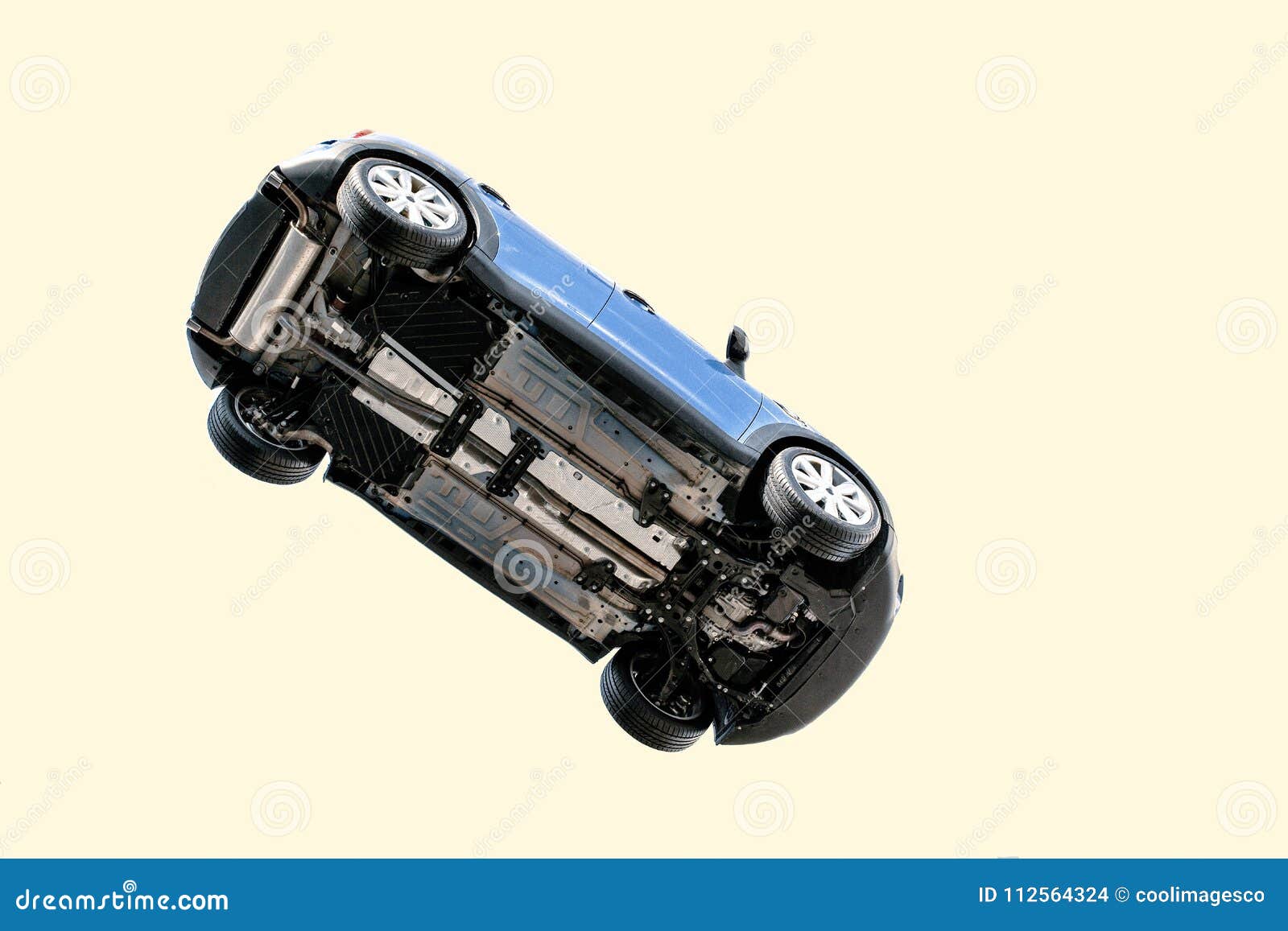 A Car Flying through the Air in the Pale Blue Sky with the Underside ...