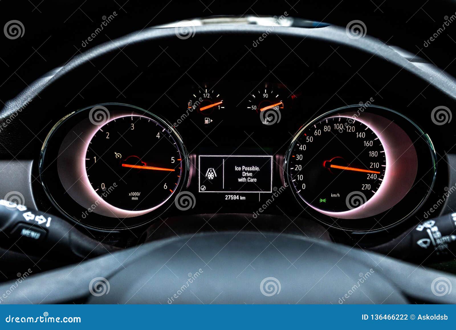 Car Front Instrument Panel with Warning of Slippery Roads. Stock Photo ...