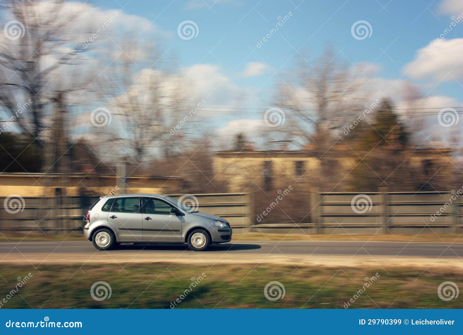 Car speeding down the road stock image. Image of drive - 29790399