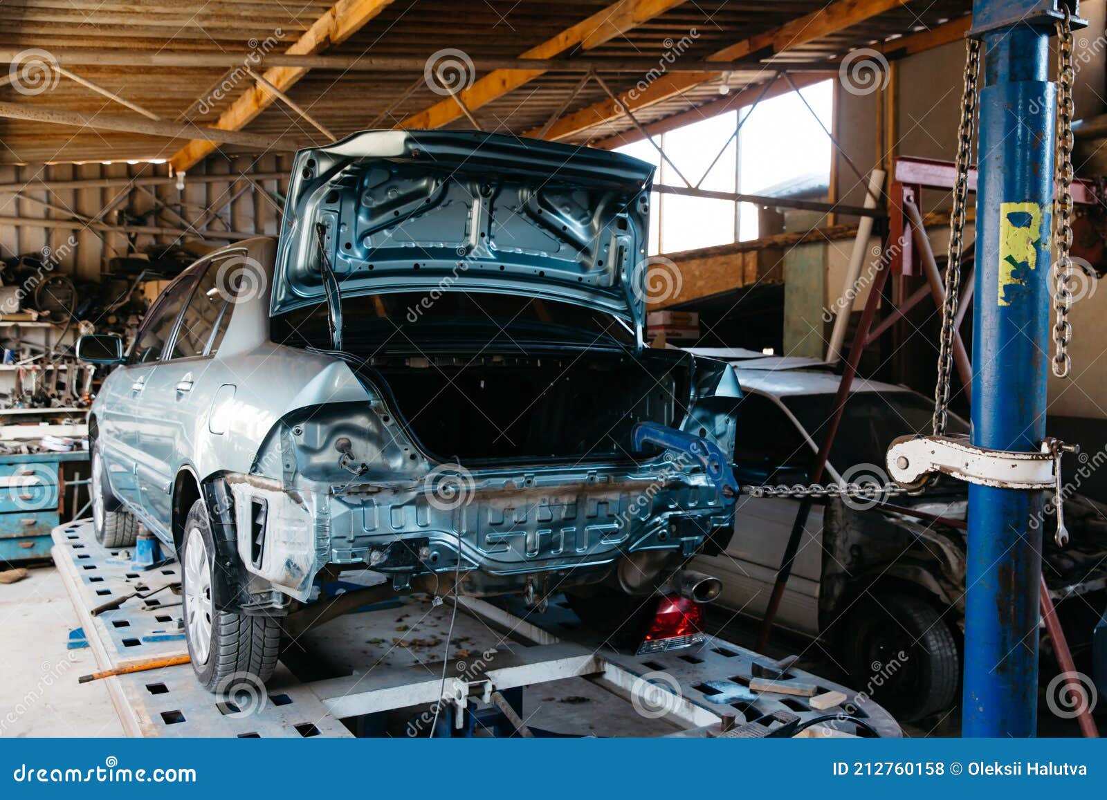 Car Has Dented Rear Bumper Damaged after Accident. Pulling Auto Body ...