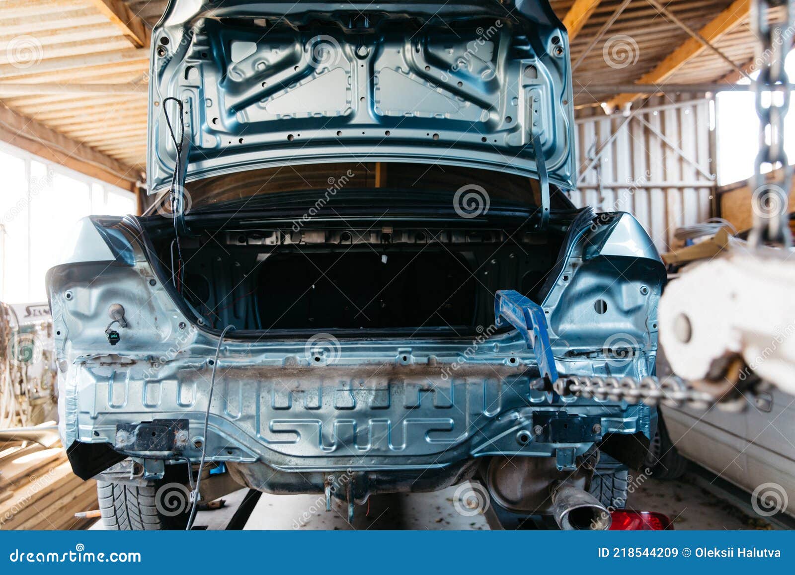 Car Has Dented Rear Bumper Damaged after Accident. Pulling Auto Body ...