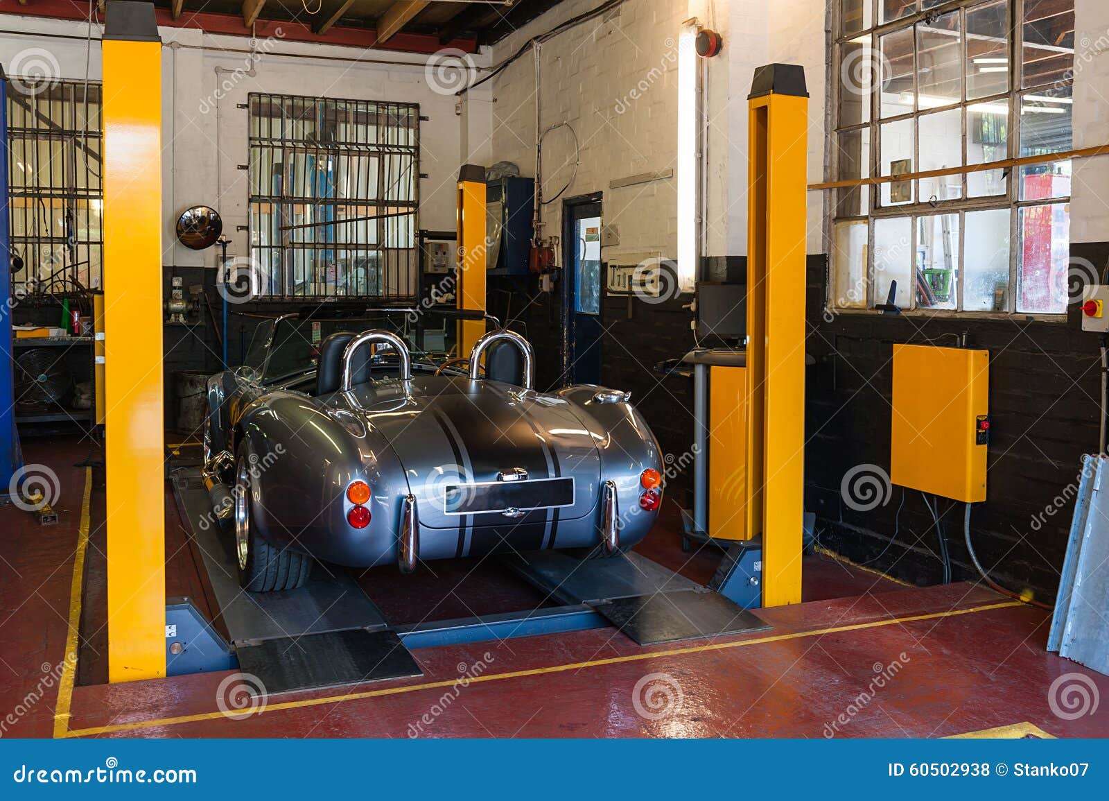 Car inspection stock photo. Image of dealer, device, hydraulic - 60502938