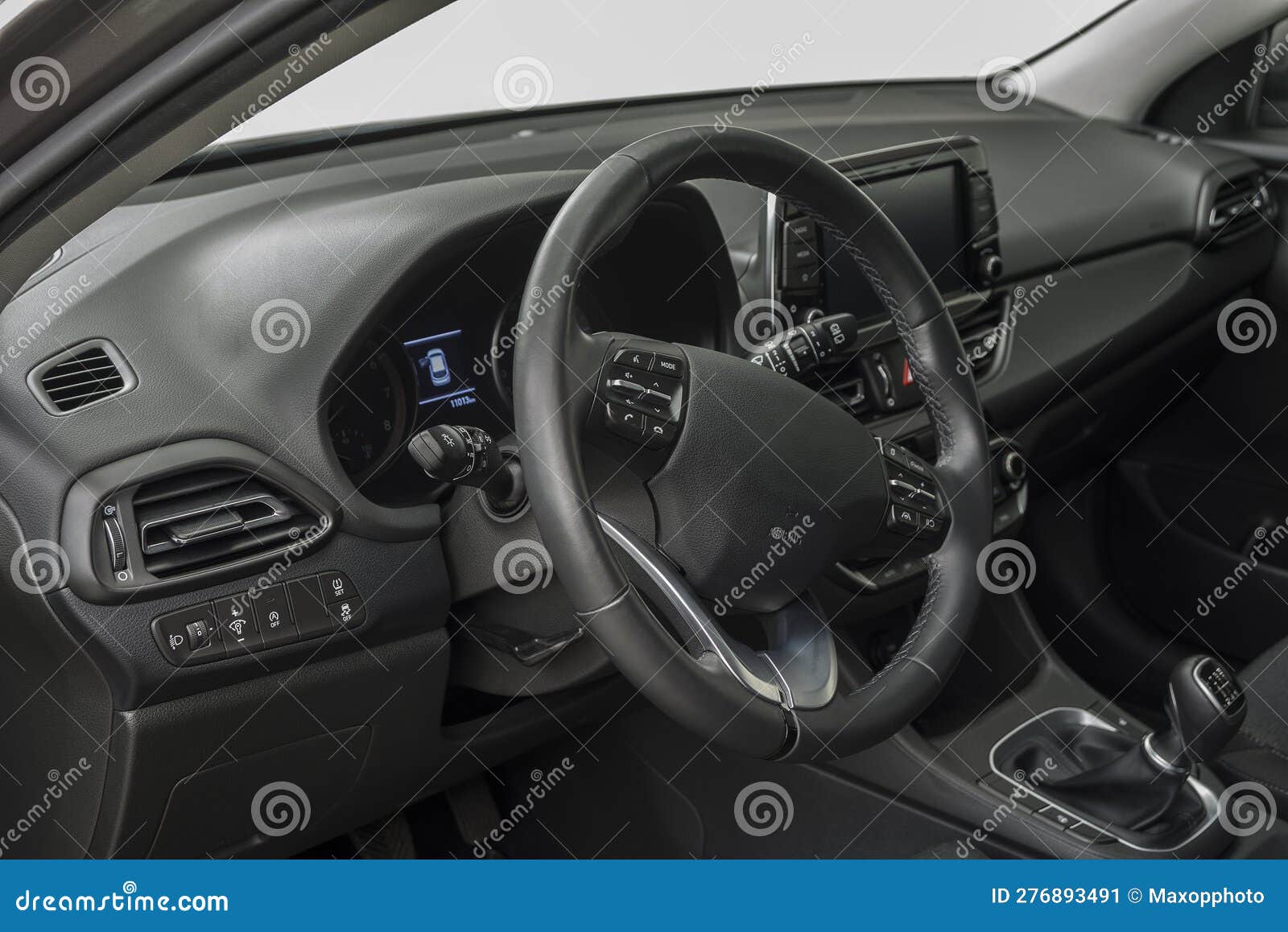 Car Interior with a Steering Wheel, Control Buttons and Manual Shift ...