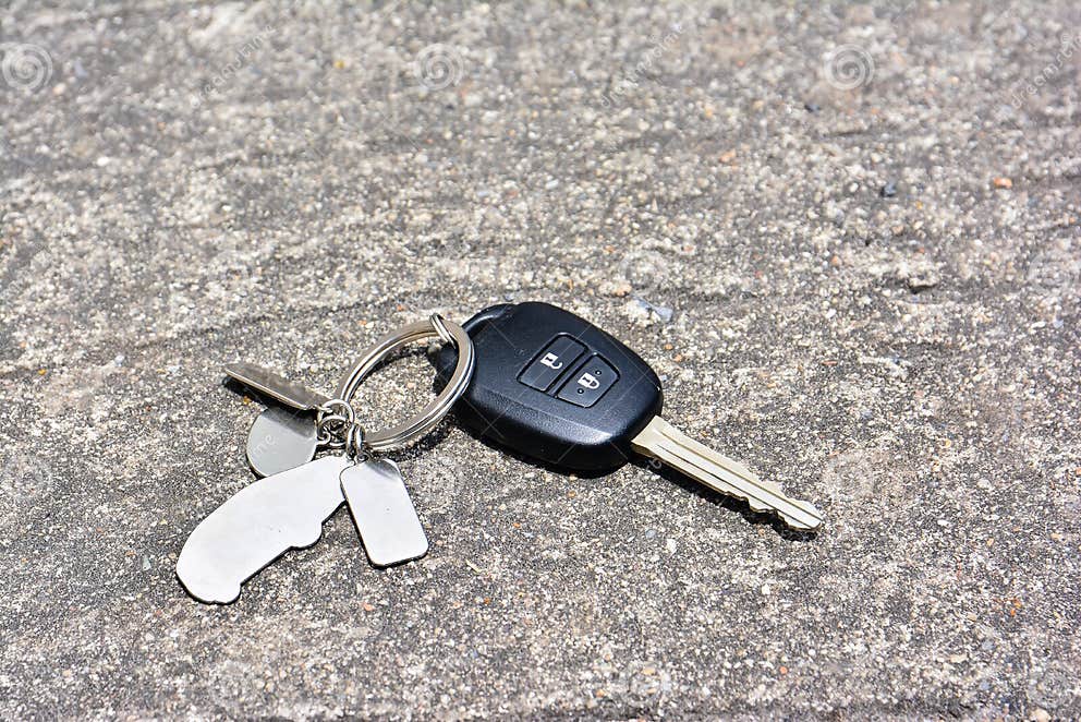 Car Key Drop on the Road Background. Car Key Lost on the Road Stock ...