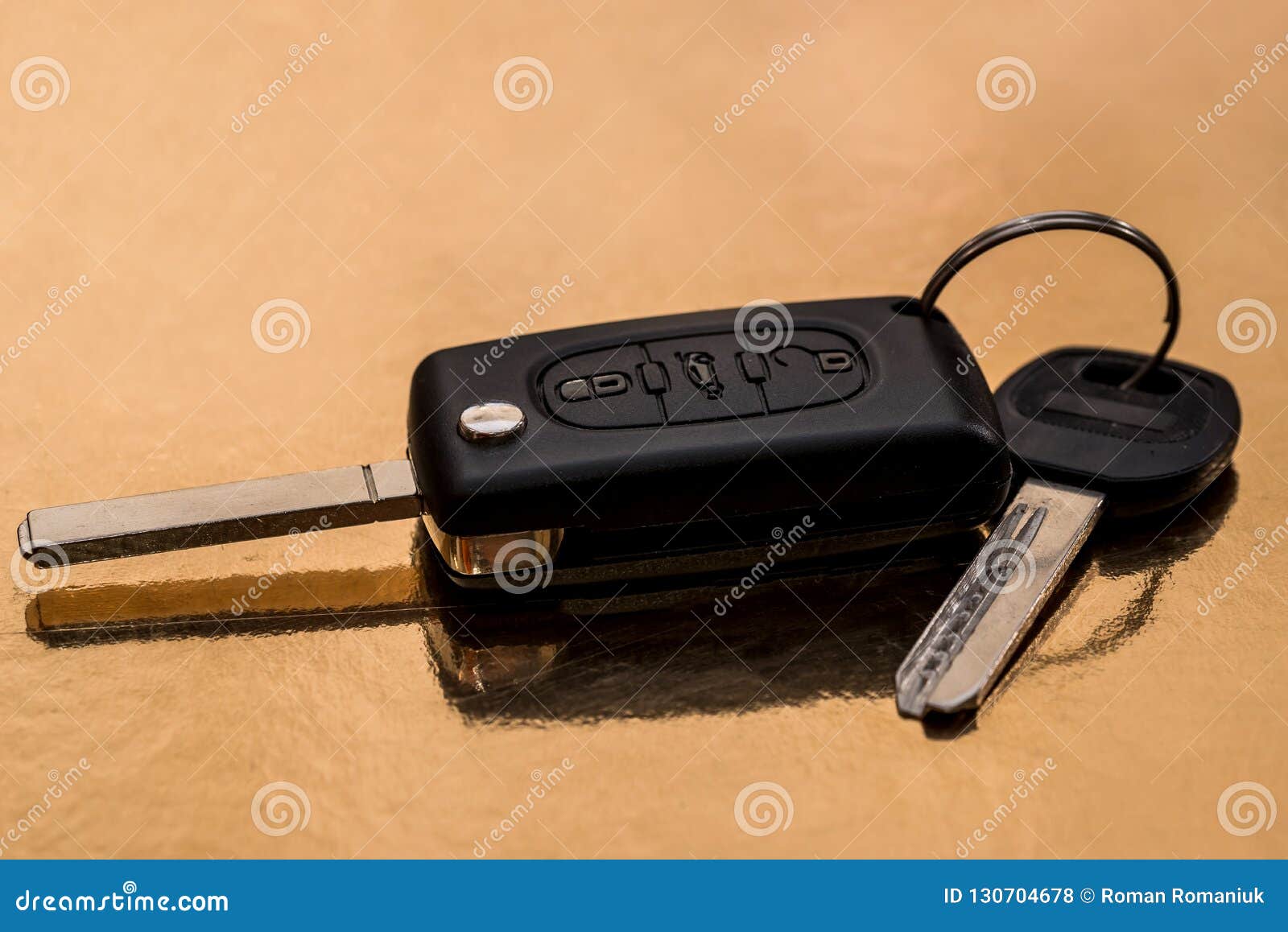 Car key isolated on gold. stock photo. Image of gold - 130704678