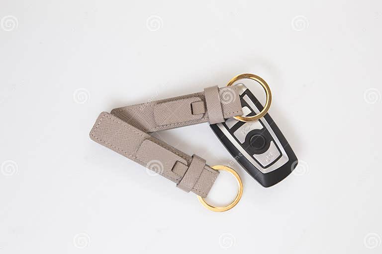 Car Key with Wireless Remote and Leather Chain on White Background ...
