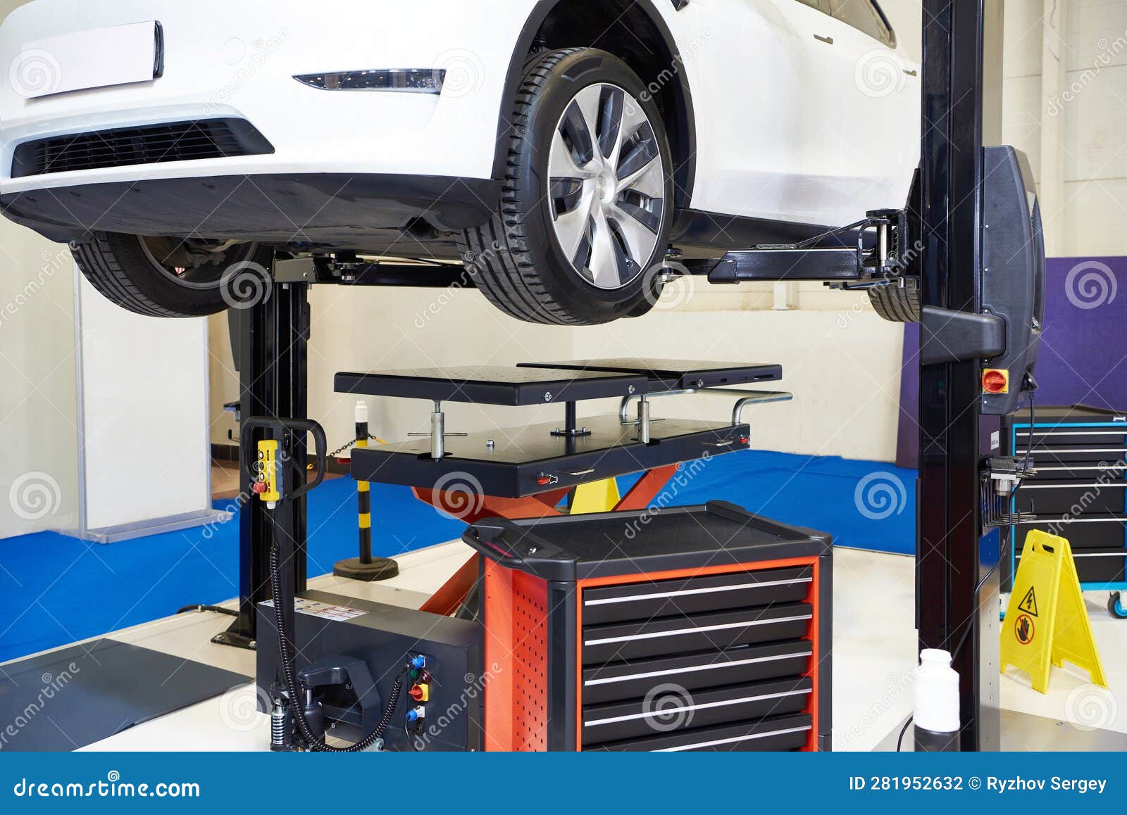 Car on lift in car service stock photo. Image of automobile - 281952632