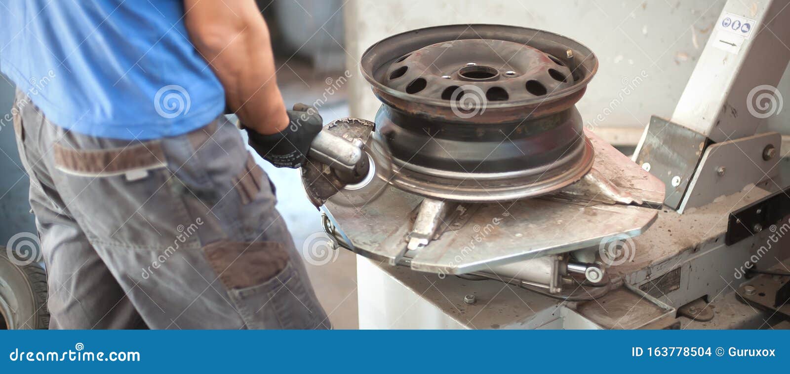 Auto Mechanic Vulcanizer Using Grinding Wheel in Auto Vulcanizing Service Stock Photo - Image of ...