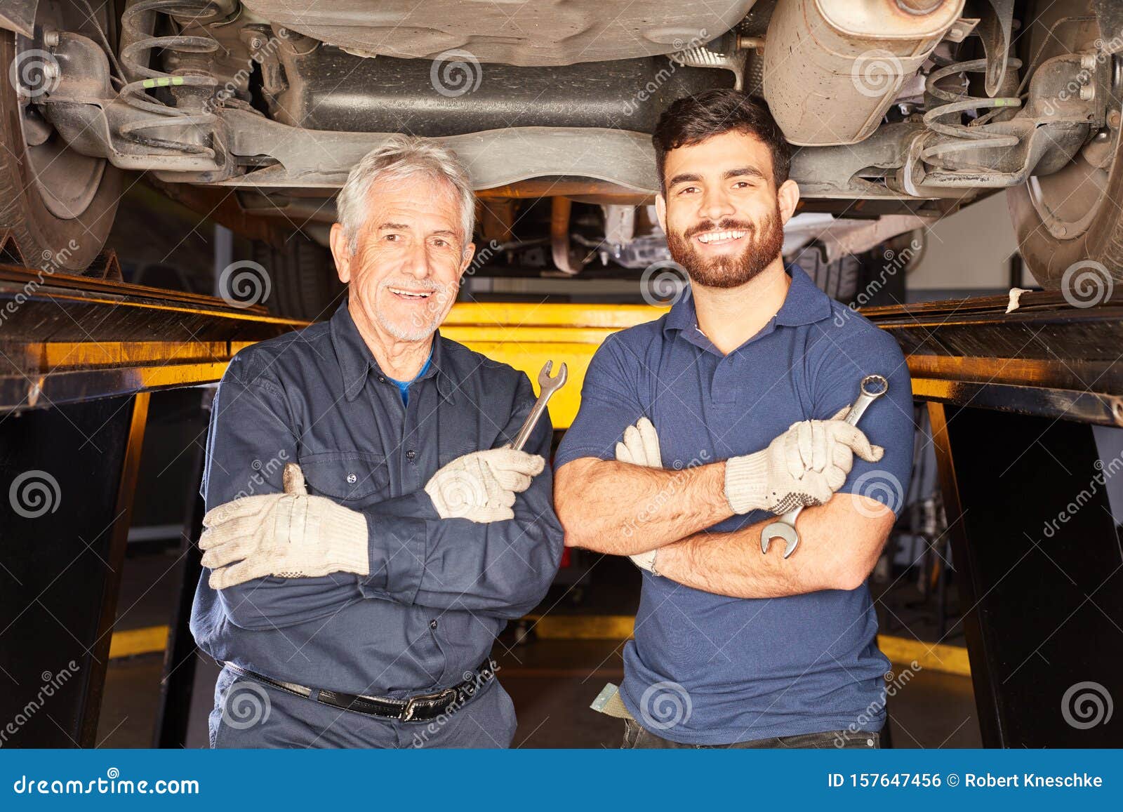 Car Master and Mechatronic Apprentice in Front of Car Stock Photo ...