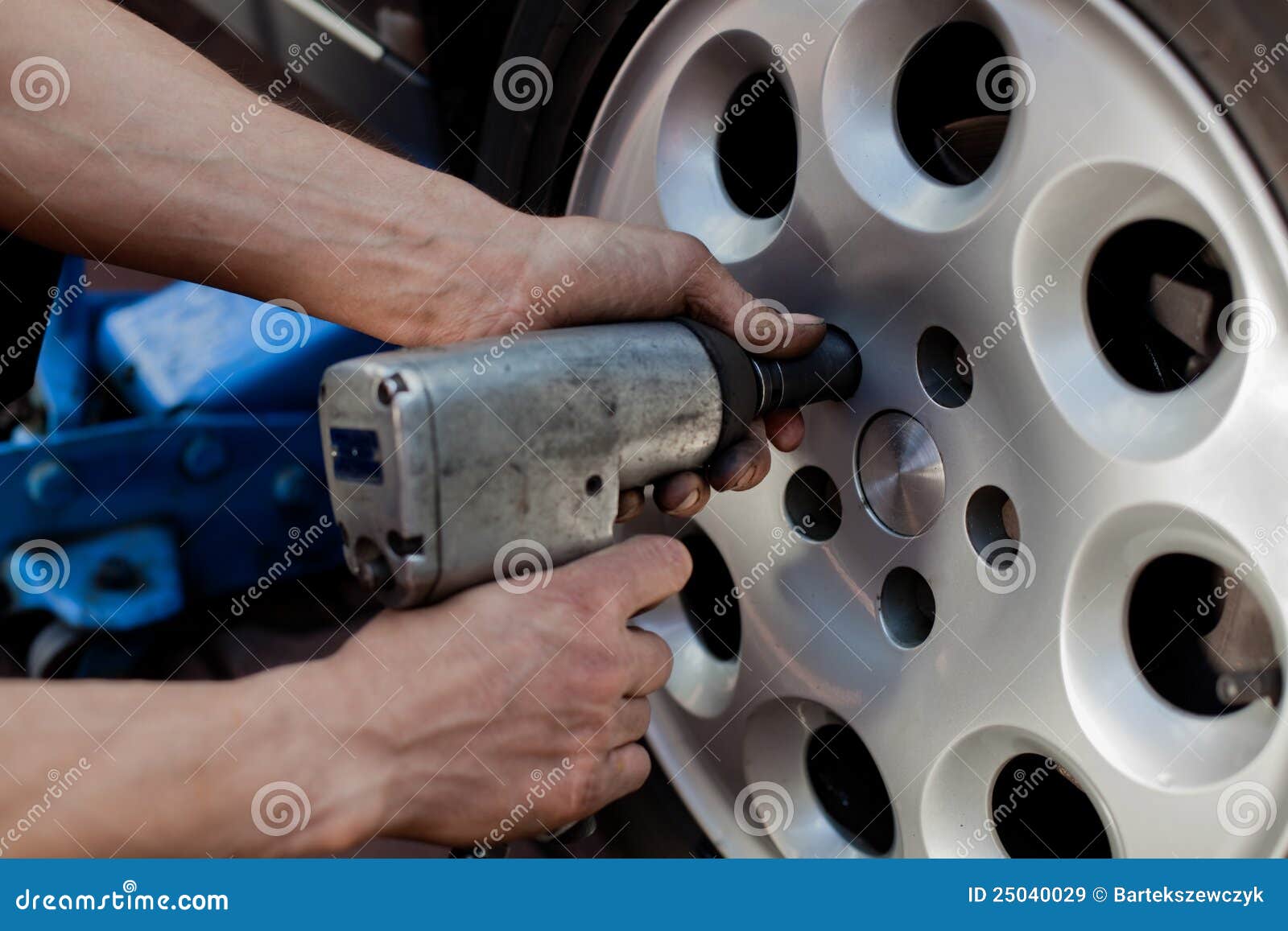 Car Mechanic Changing Wheel Stock Image - Image of holding, alloy: 25040029