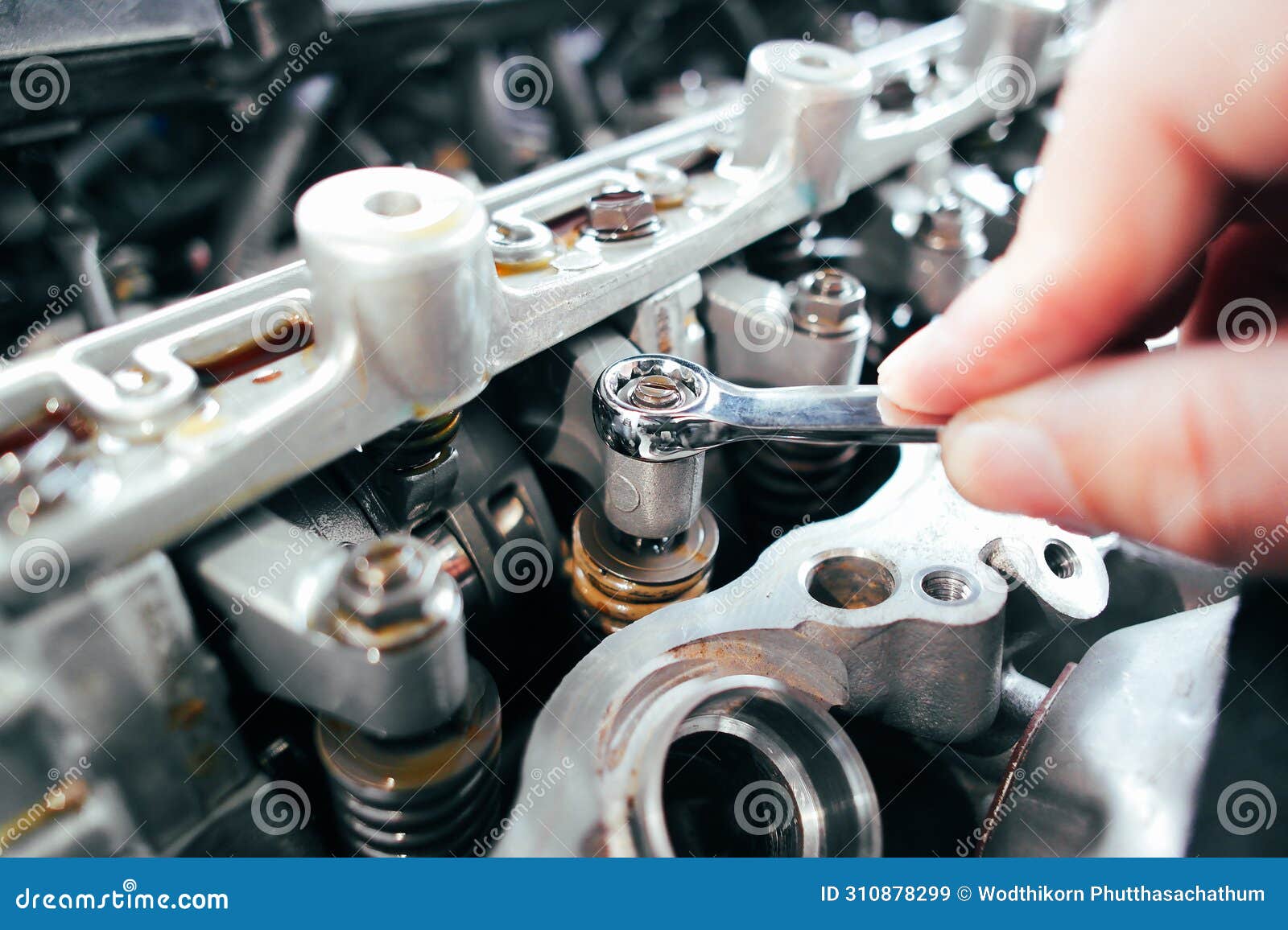 Car Mechanic Checking and Adjusting Valves of Car Engine Stock Image ...