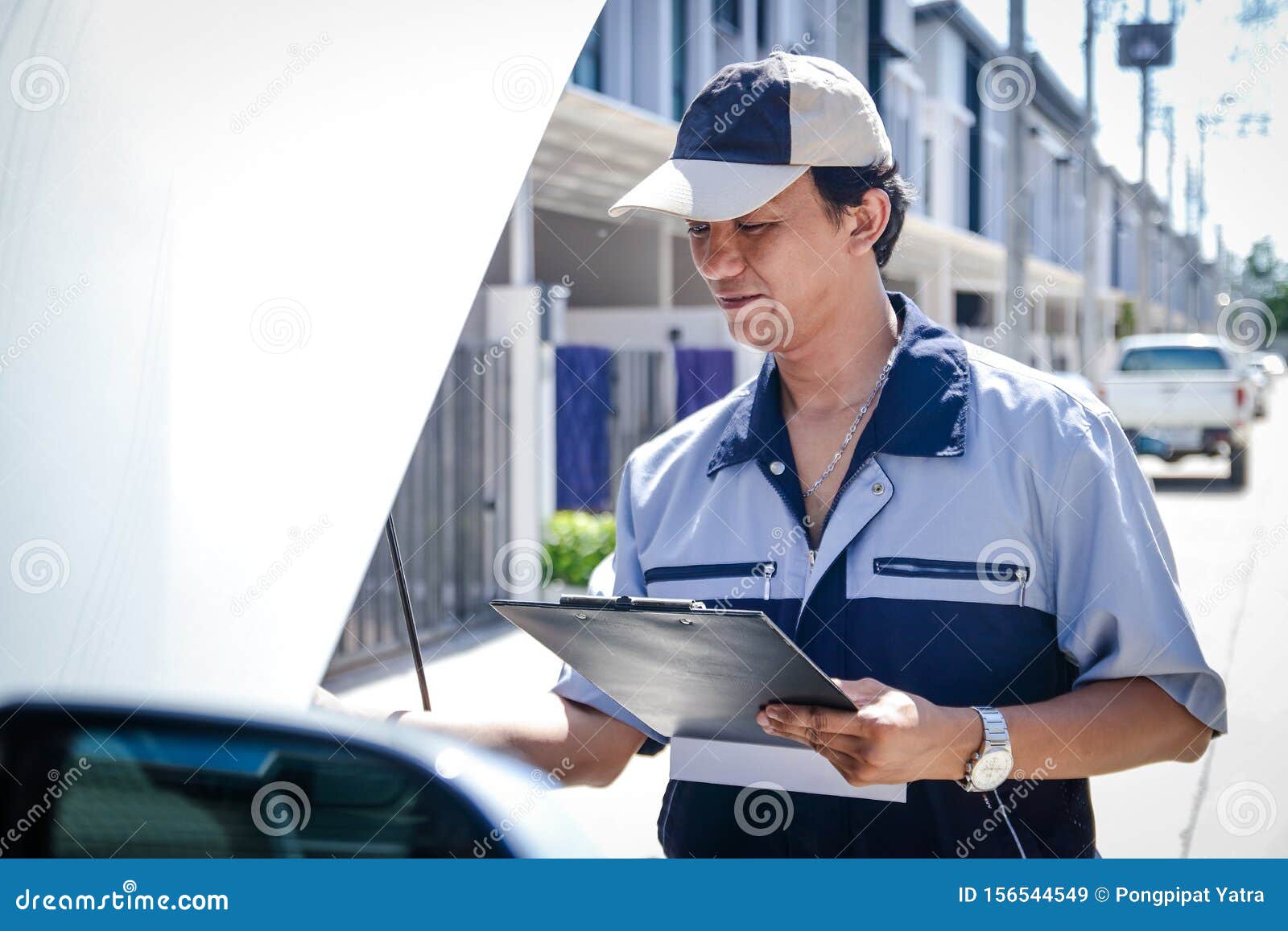 The Car Mechanic is Checking the Engine System Stock Image - Image of ...