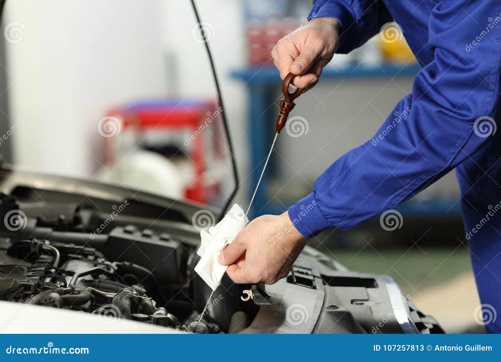 Car Mechanic Checking Oil Level Stock Image - Image of detail, indoor ...