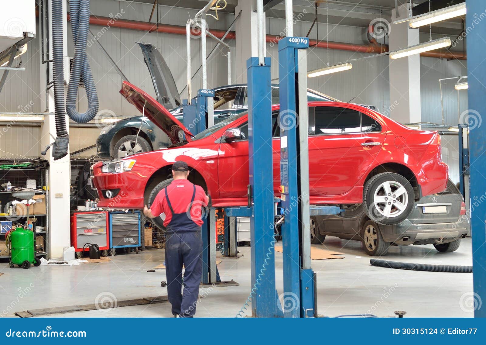Automotive Worker at Car Service Editorial Stock Image - Image of ...