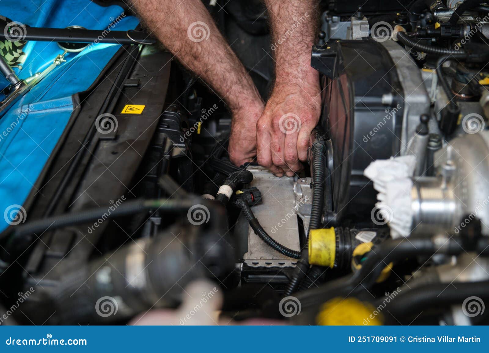 Car Mechanic Hands Replacing Intercooler on a Car Engine. Stock Image ...