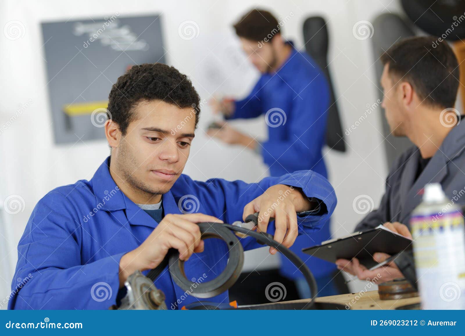 Car Mechanic Man at Garage Fixing Engine Stock Photo - Image of ...