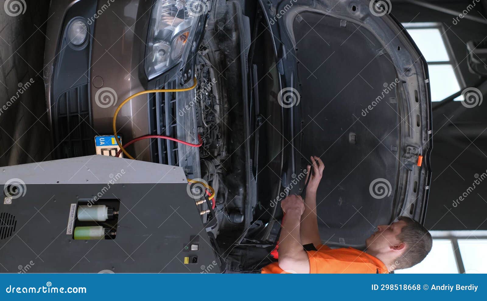 A Car Mechanic Repairs the Air Conditioner in a Car. Car Climate ...