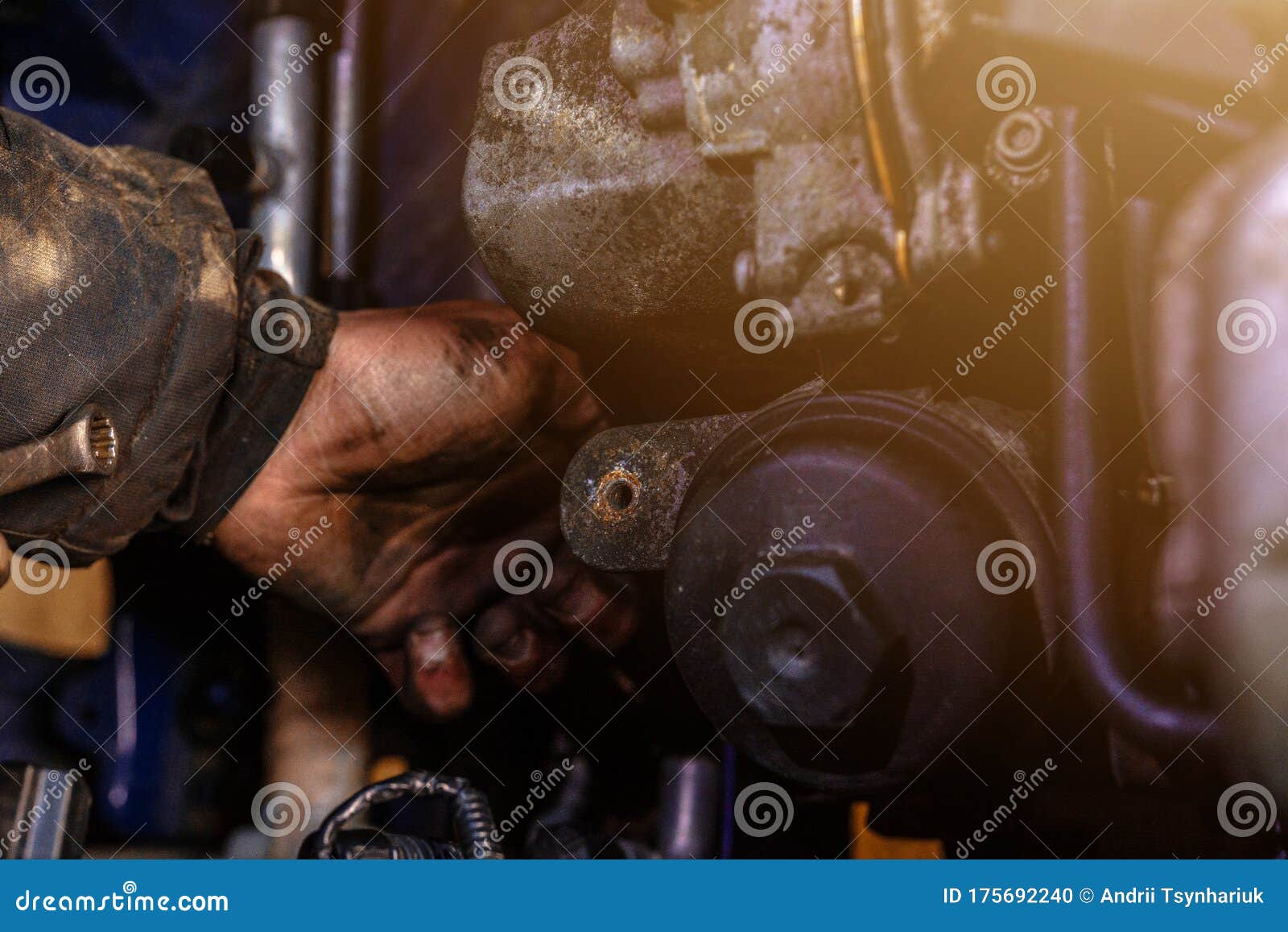 Car Mechanic Servicing Car Engine in Car Service Closeup Stock Photo ...