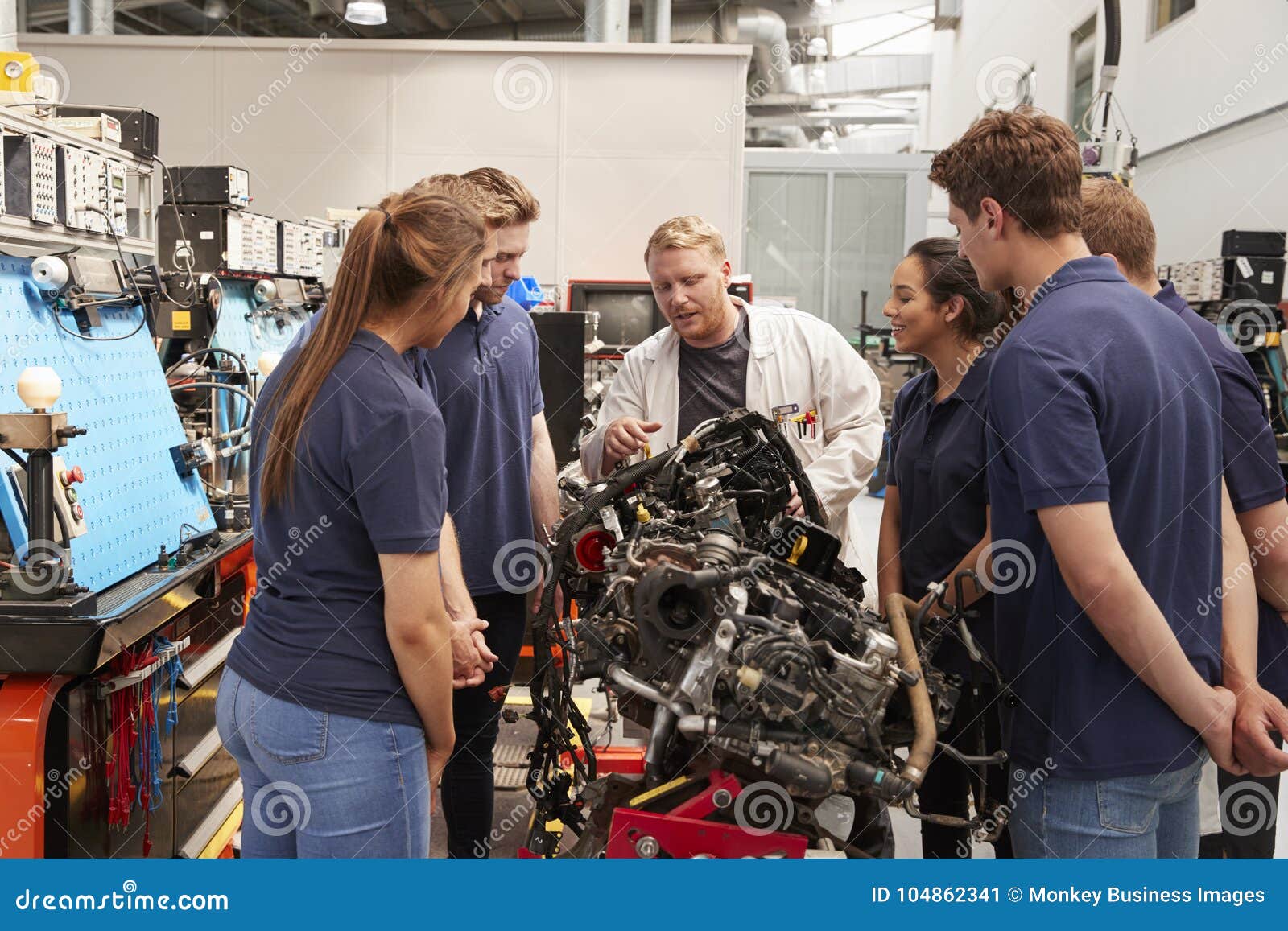 Car Mechanic Showing Engines To Apprentices Stock Image - Image of ...