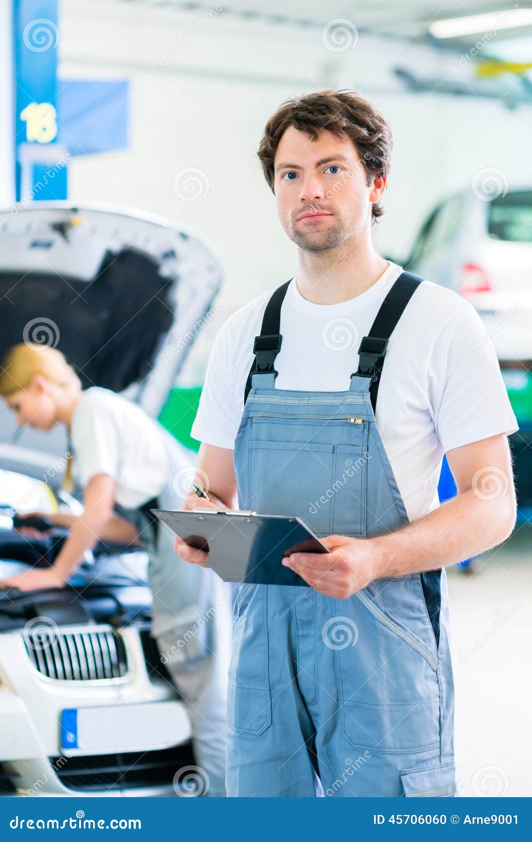 Car Mechanic Team Working in Auto Workshop Stock Photo - Image of ...
