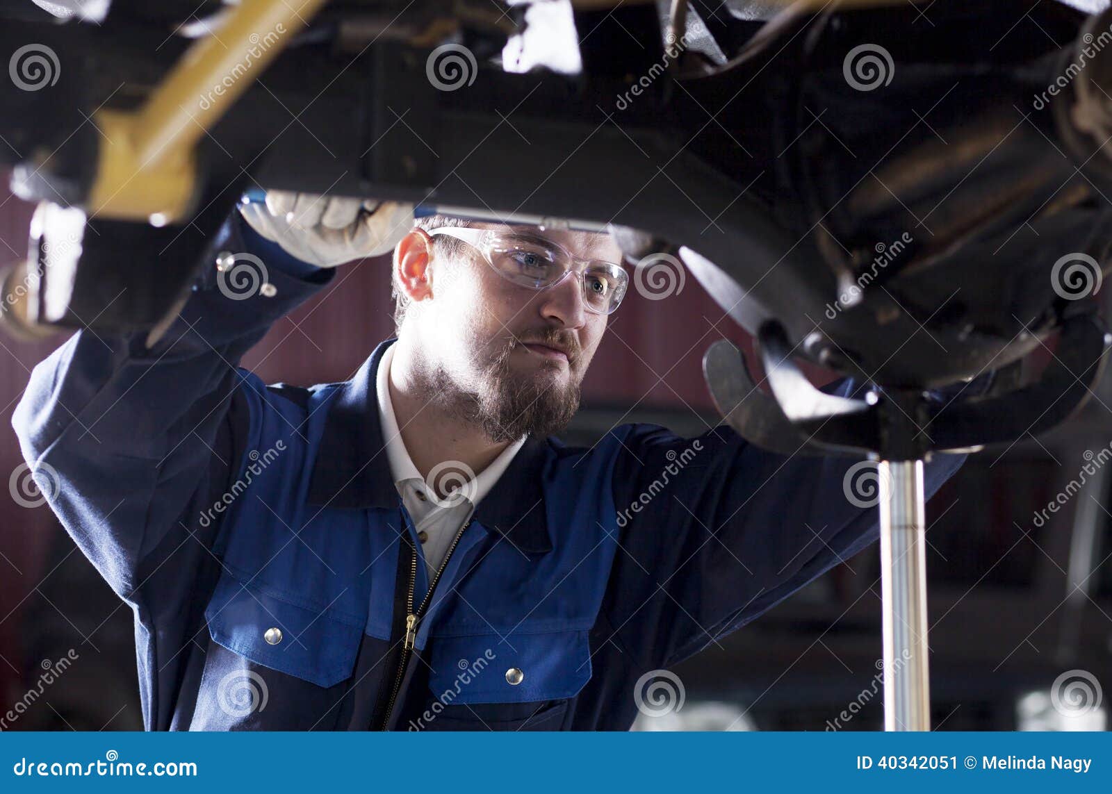 Car mechanic at work stock image. Image of garage, looking - 40342051