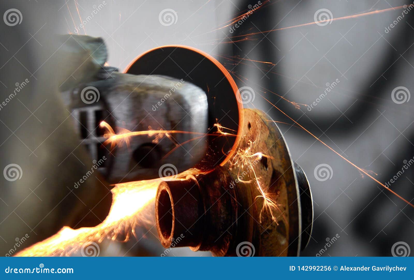 Car Mechanic Working with Angular Grinding Machine Stock Photo - Image ...