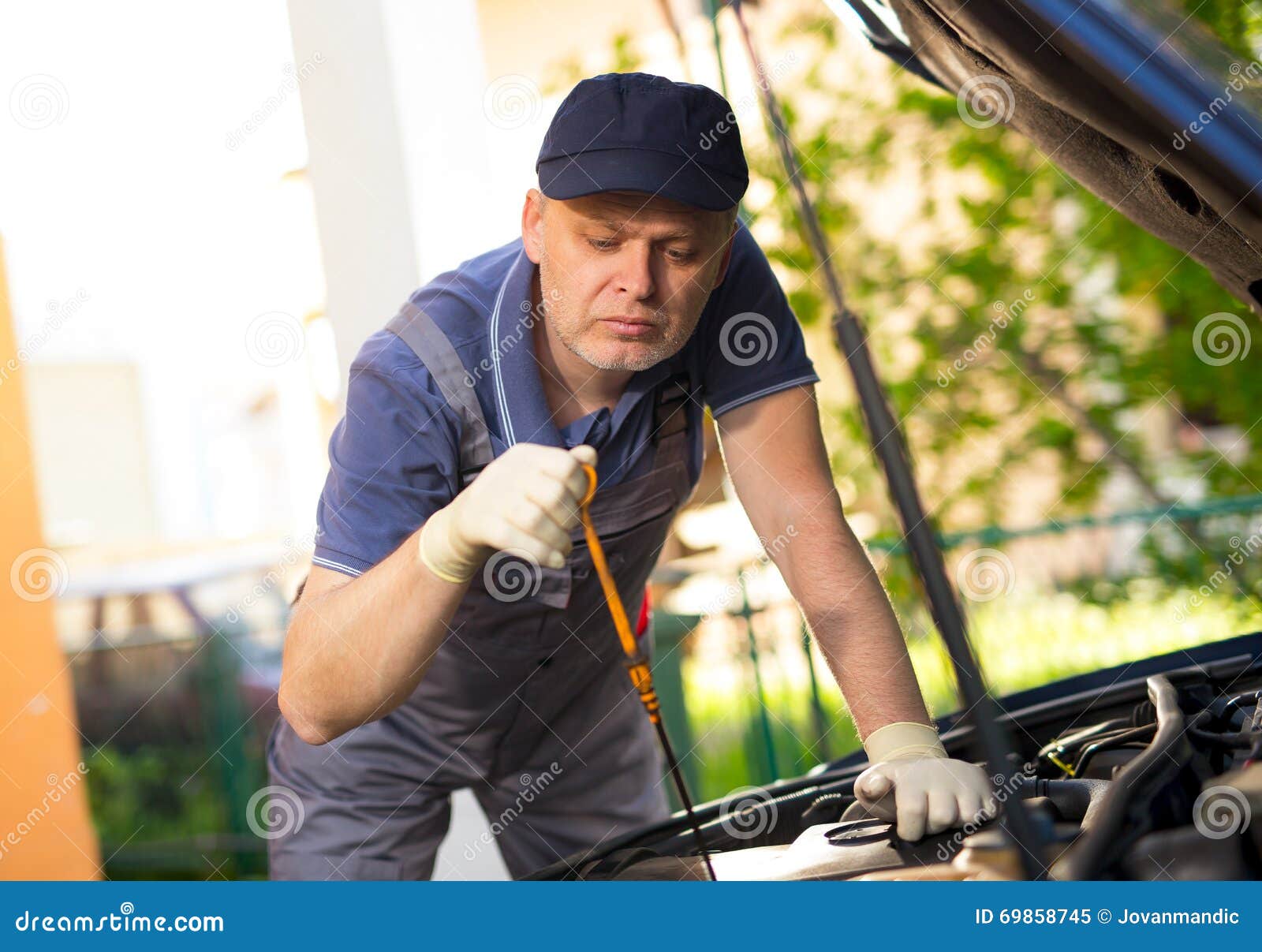 Car Mechanic Working in Auto Repair Service. Stock Image - Image of ...