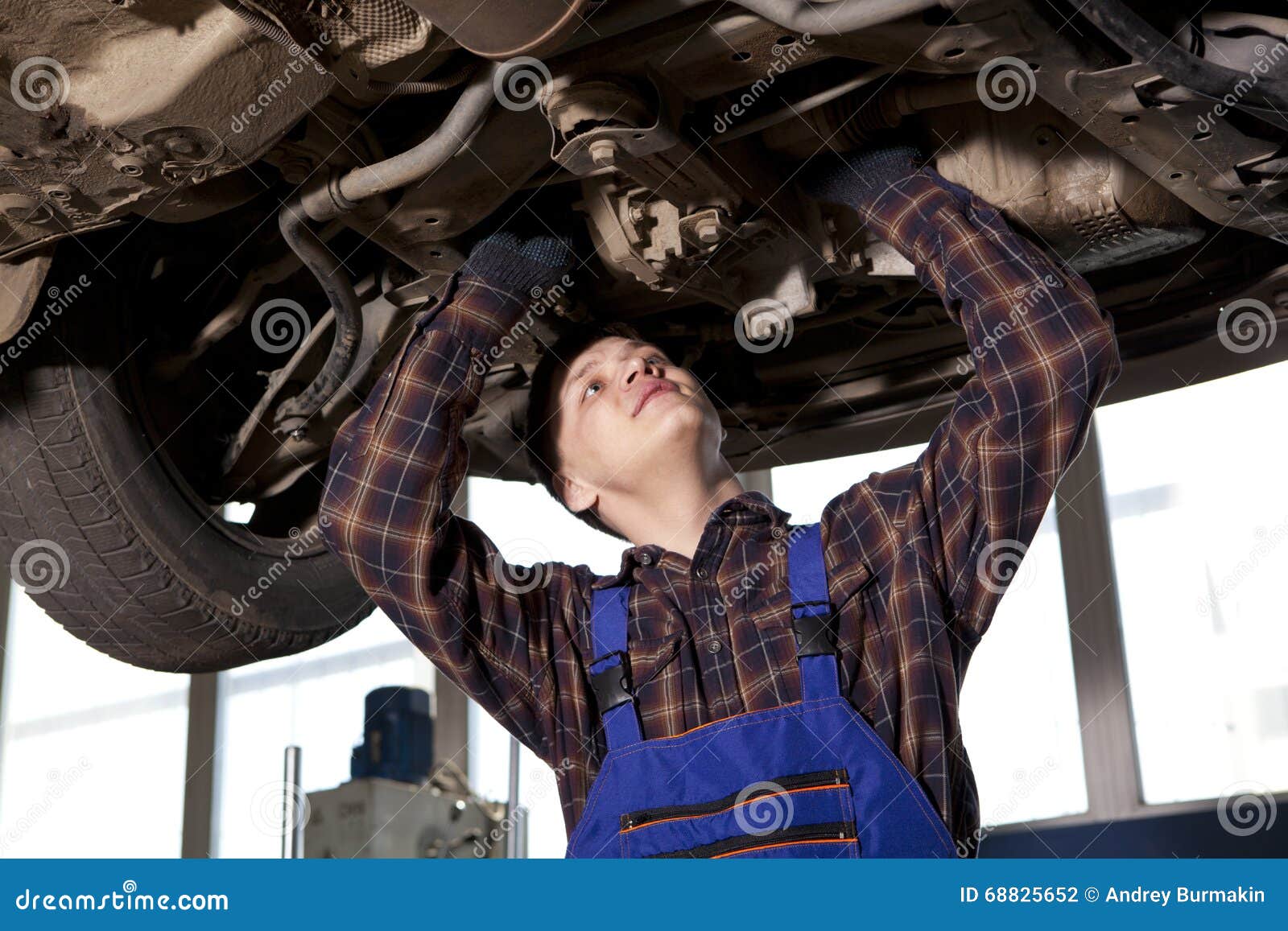 Car Mechanic Working in Auto Repair Service Stock Photo - Image of tool ...