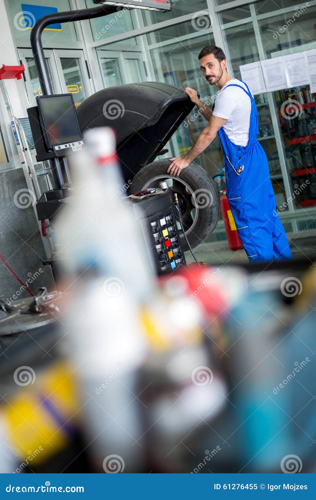 Car Mechanic Working with Machine Balancer Stock Image - Image of ...