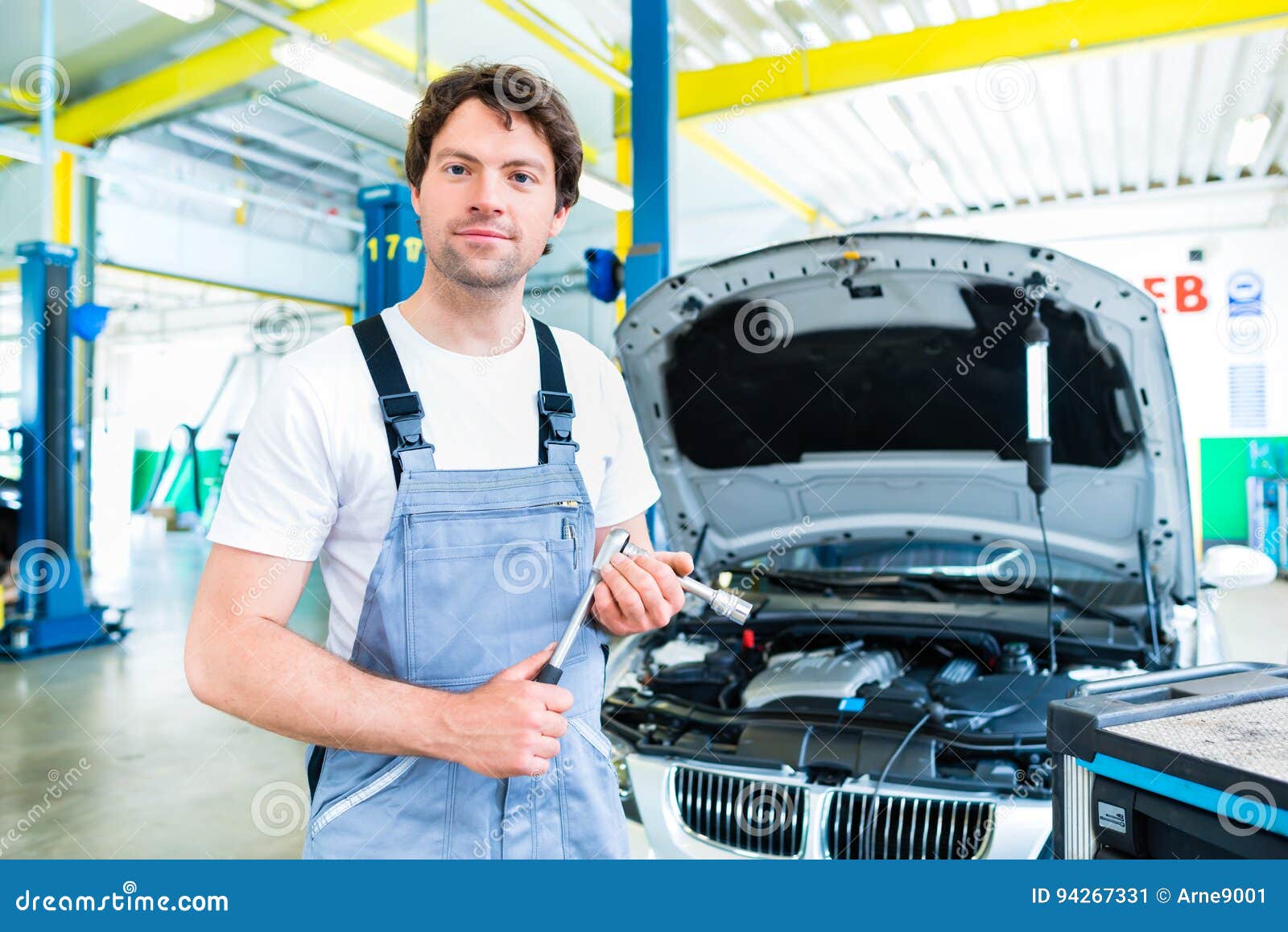 Car Mechanic Working with Tool in Service Workshop Stock Image - Image ...