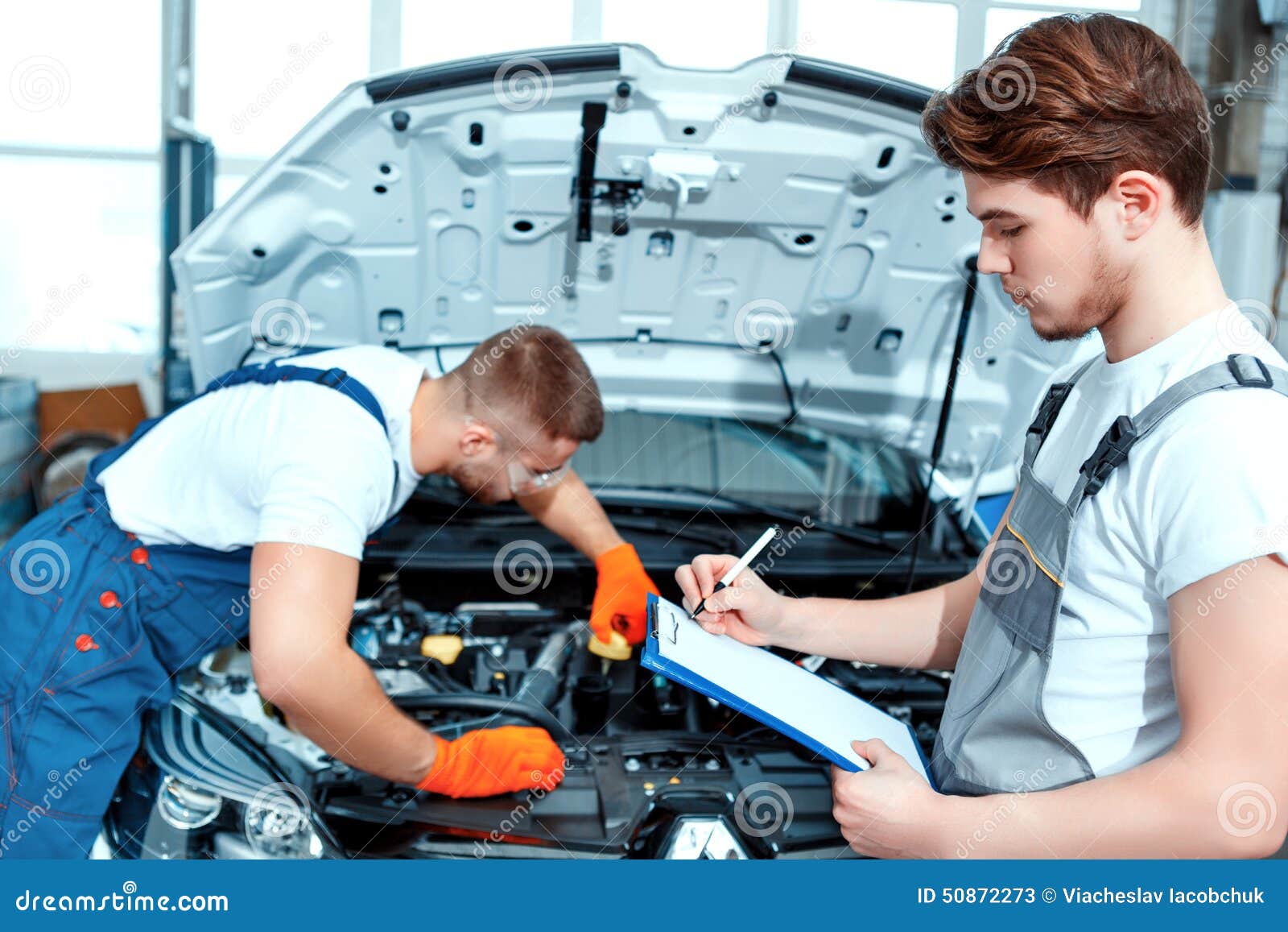 Car Mechanics at the Service Station Stock Image - Image of person ...