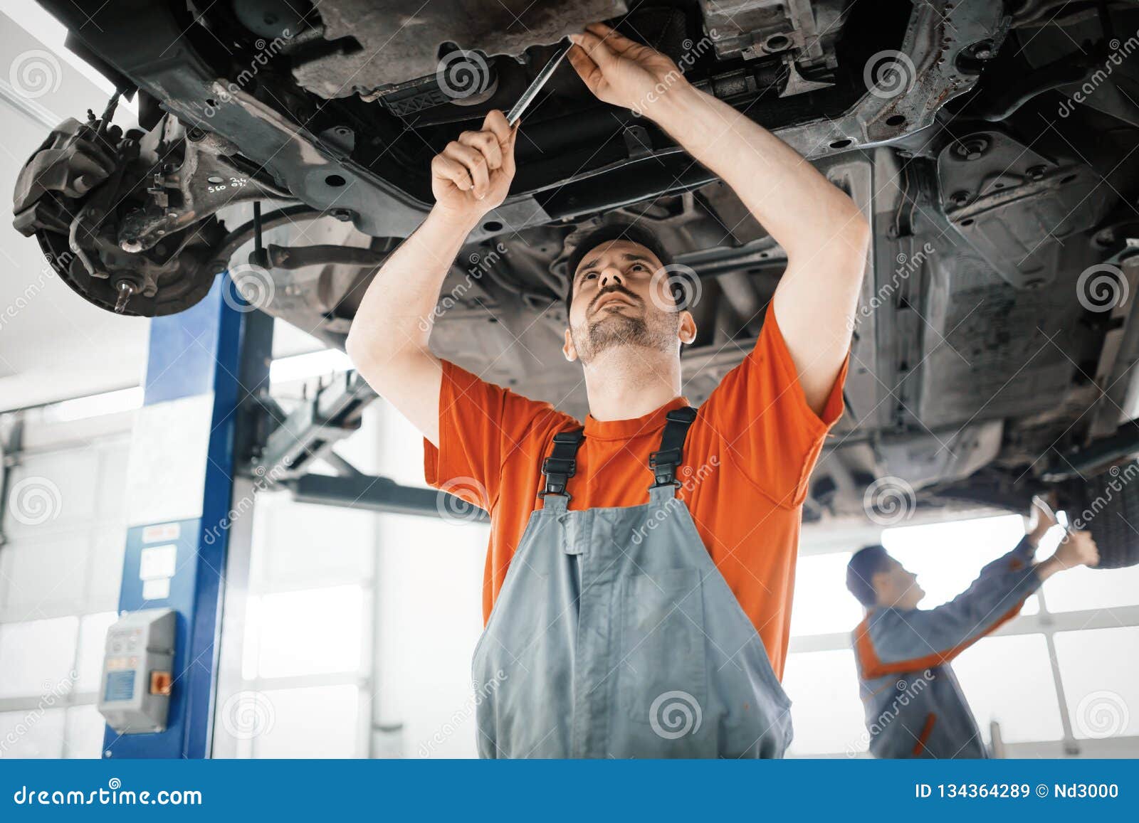 Car Mechanics Working and Maintaining Car Stock Image - Image of ...